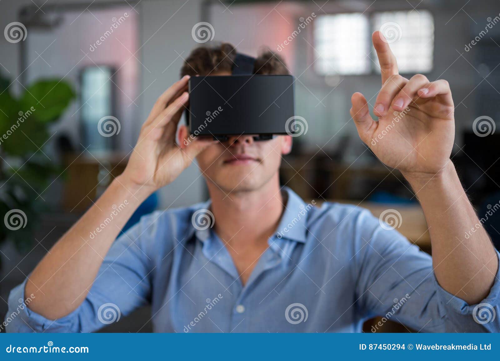 Man Using Virtual Reality Headset Stock Photo - Image of communication ...