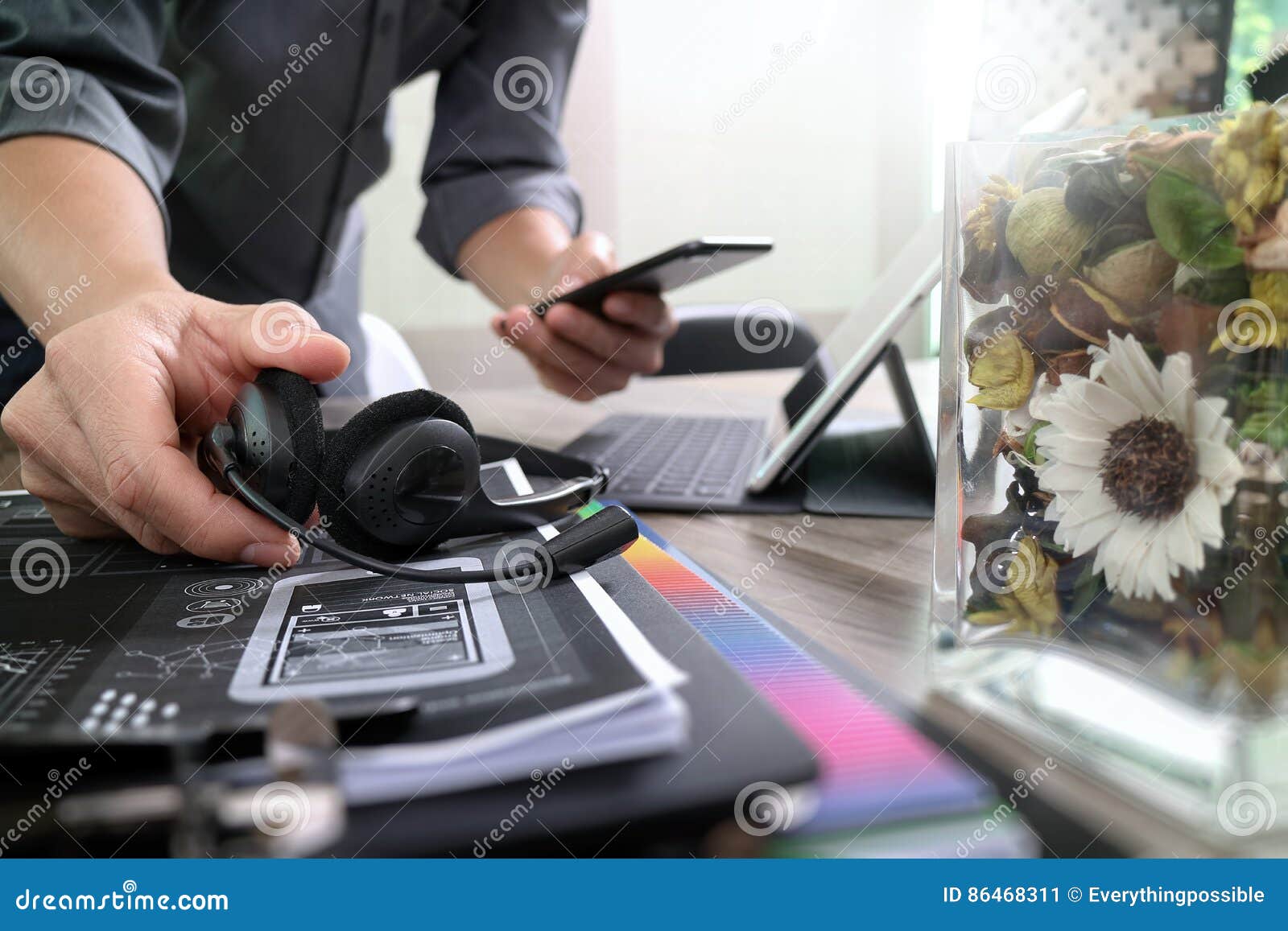 Man Using VOIP Headset with Digital Tablet Computer Docking Keyboard ...