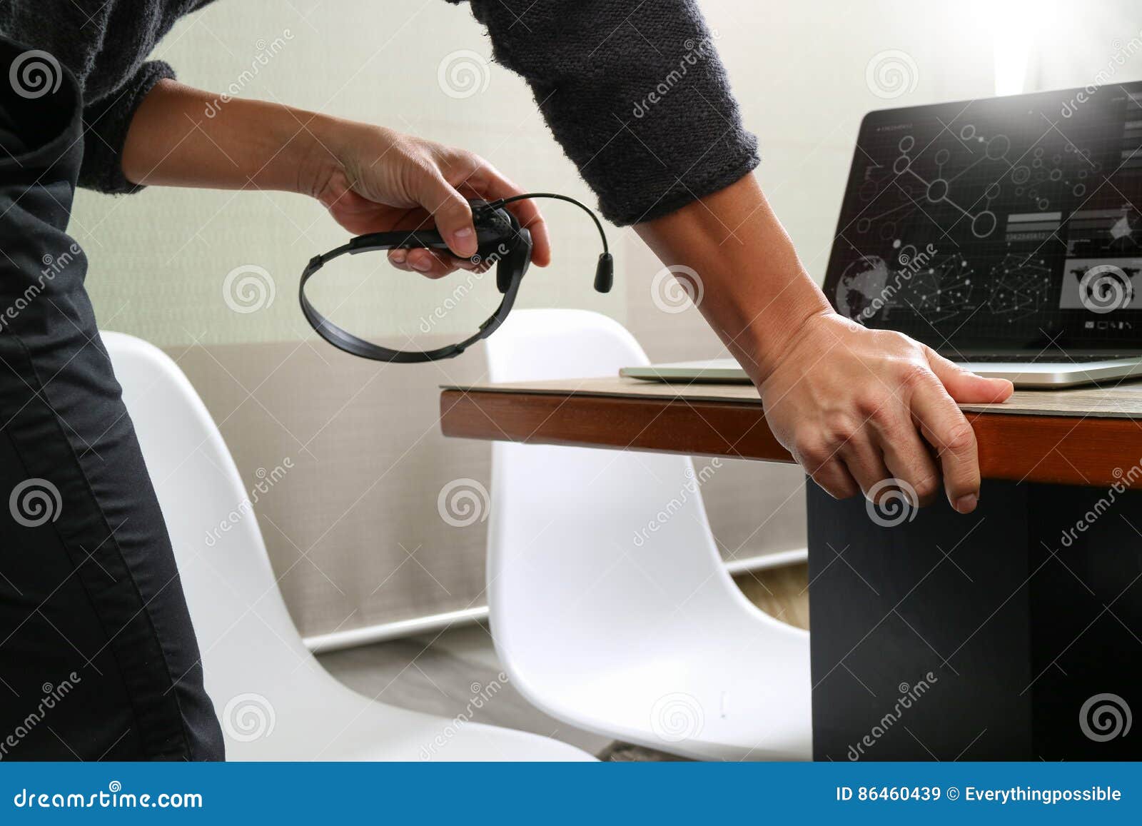 Man Using VOIP Headset with Digital Tablet Computer Docking Smart ...