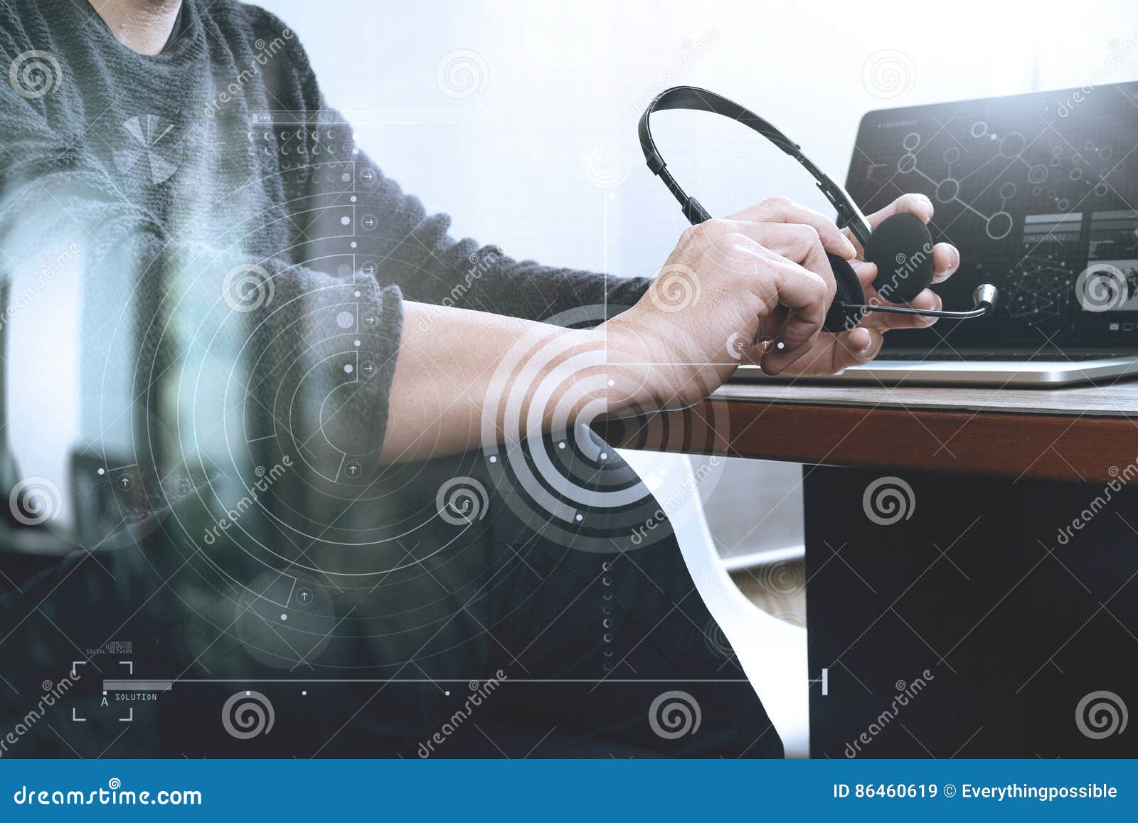 Man Using VOIP Headset with Digital Tablet Computer Docking Smart ...