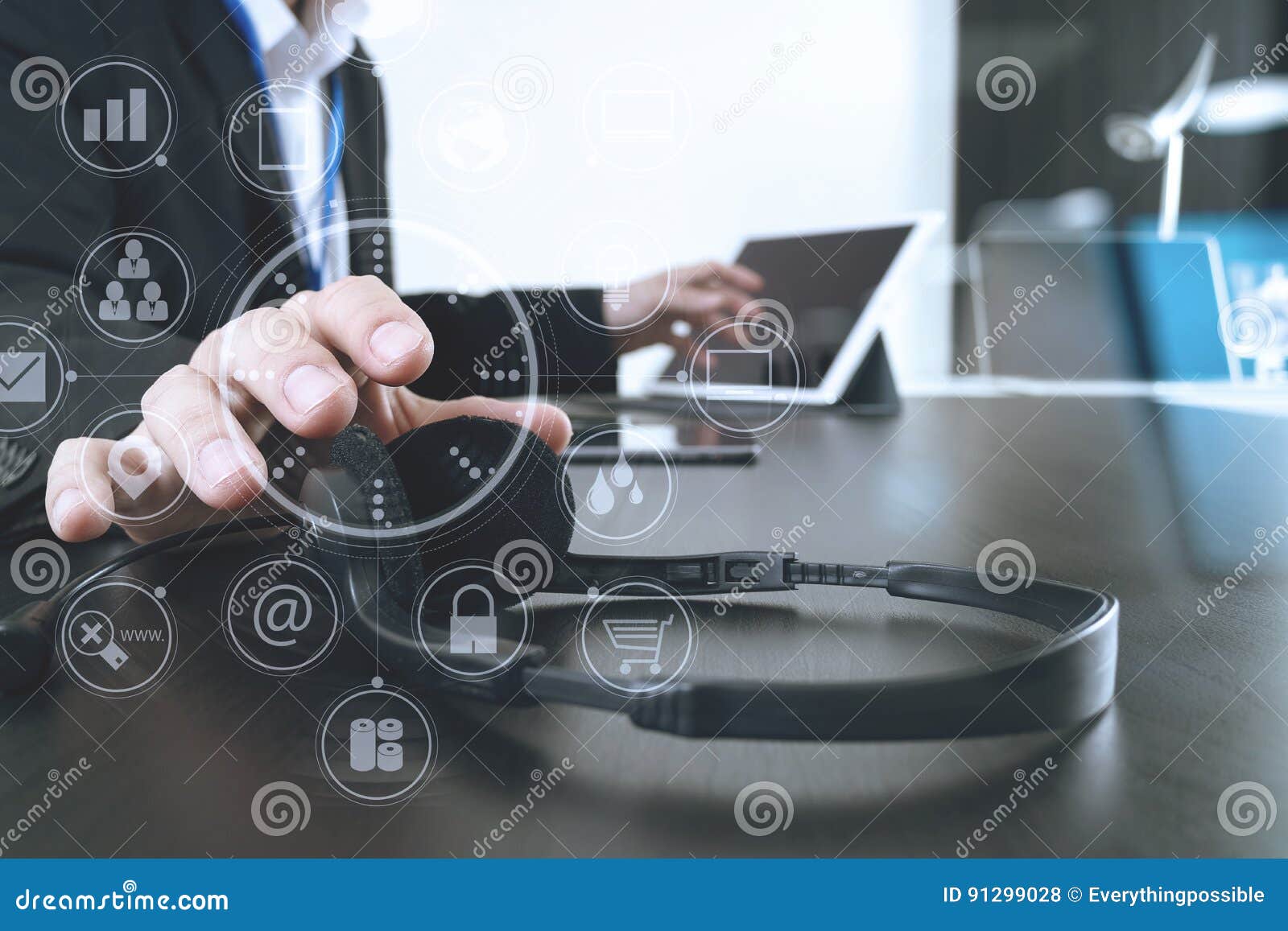 Man Using VOIP Headset with Digital Tablet and Laptop Computer a Stock ...
