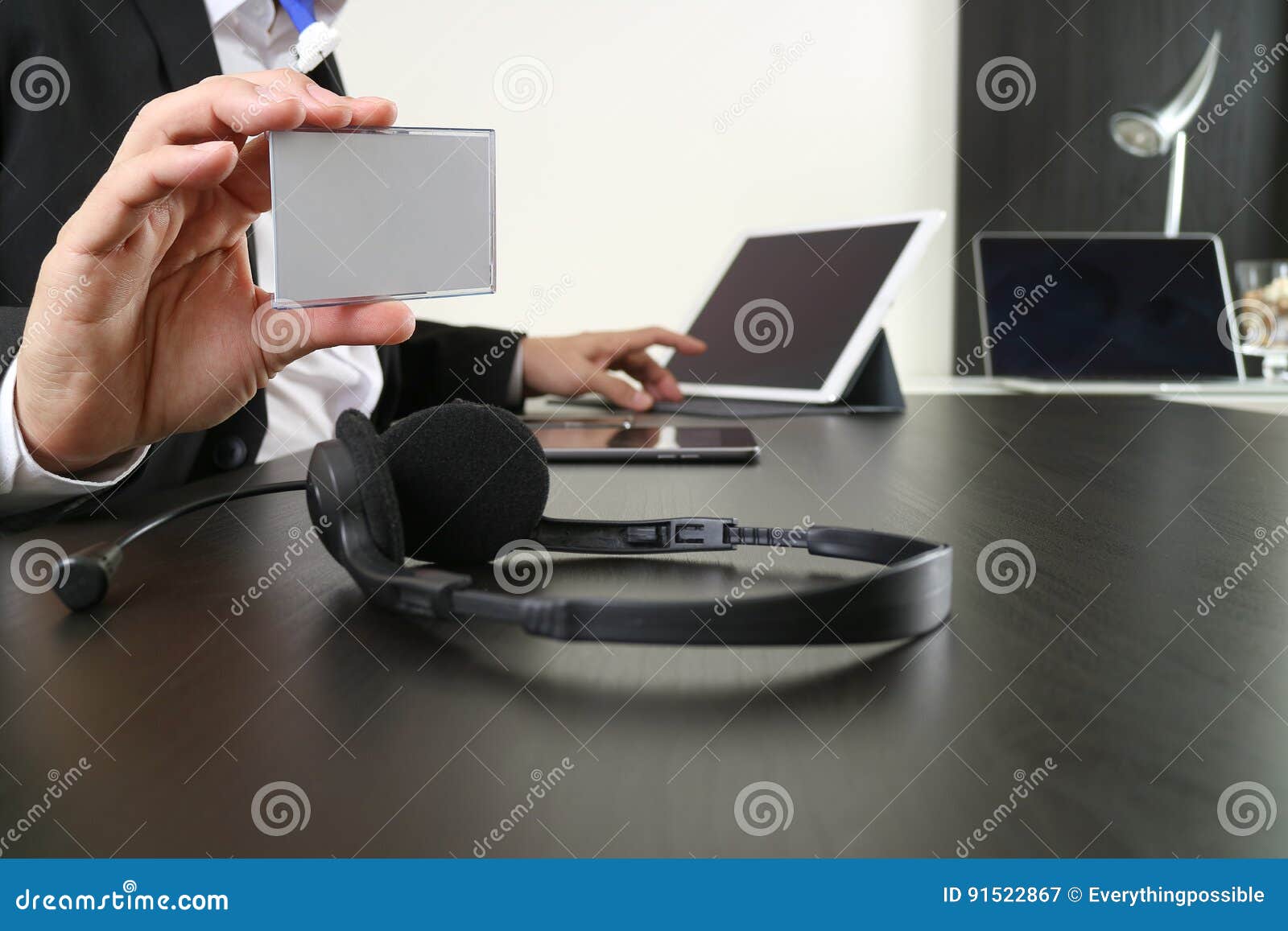Man Using VOIP Headset and Show Id Tag with Digital Tablet and L Stock ...