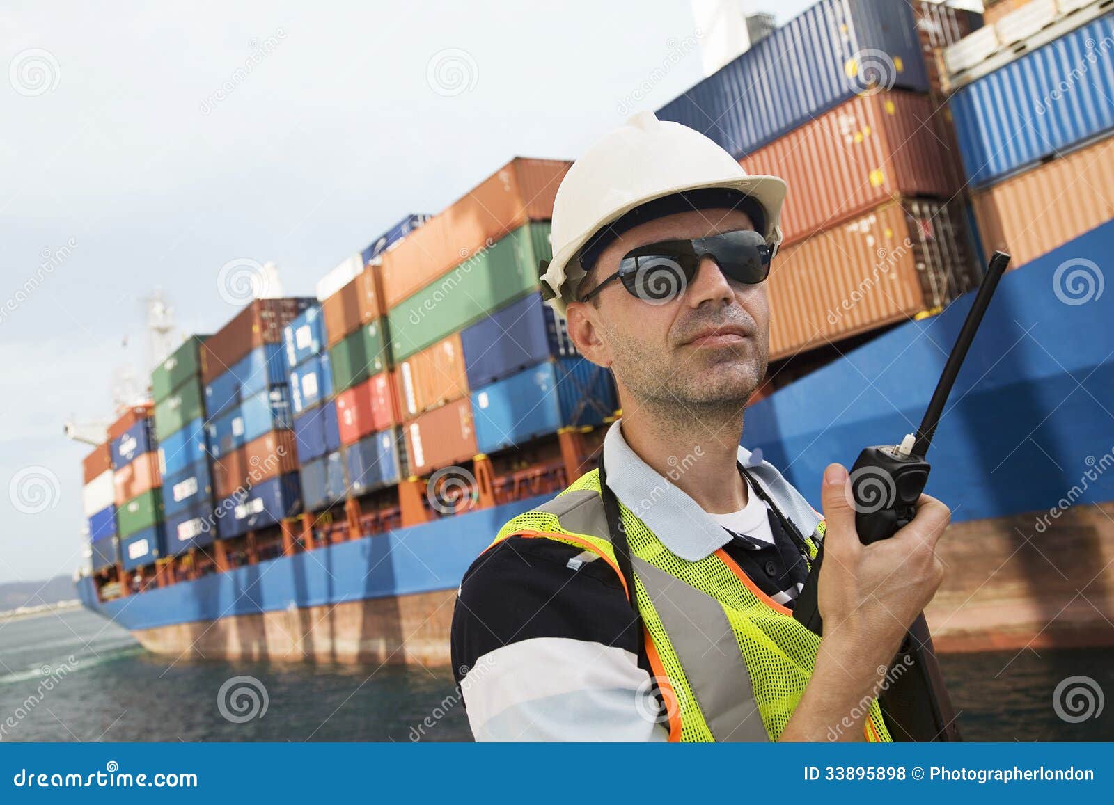 Man Using Walkie Talkie at Container Terminal Stock Photo - Image of ...