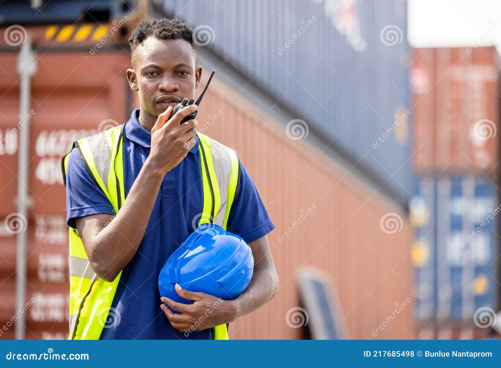 Man Using Walkie Talkie At Container Terminal, Industrial Worker Is ...