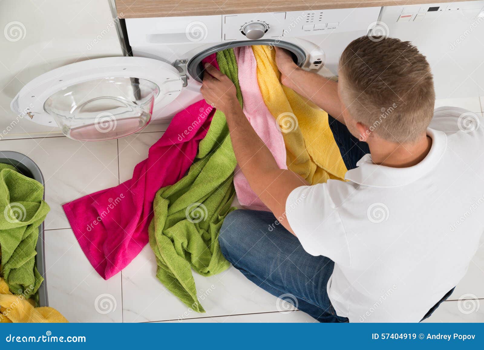 Man Using Washing Machine stock image. Image of household - 57404919