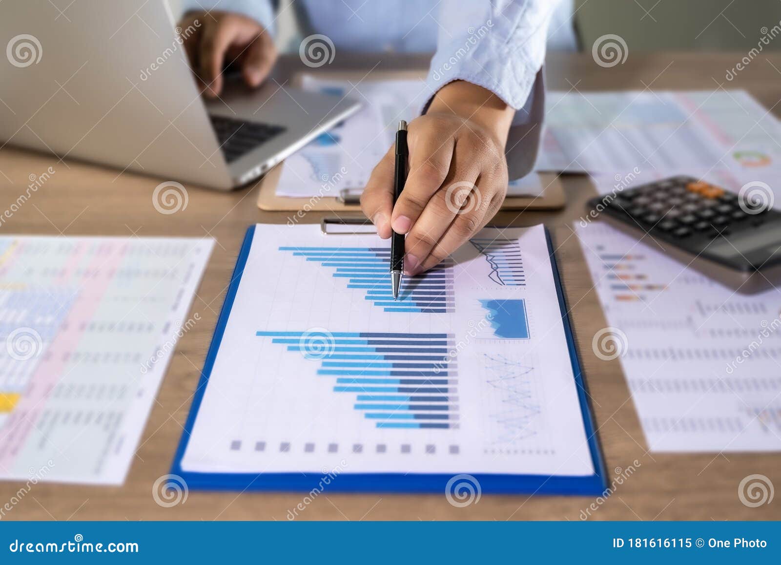 Man Usingcalculator with Money Stack Financial Report- Business ...