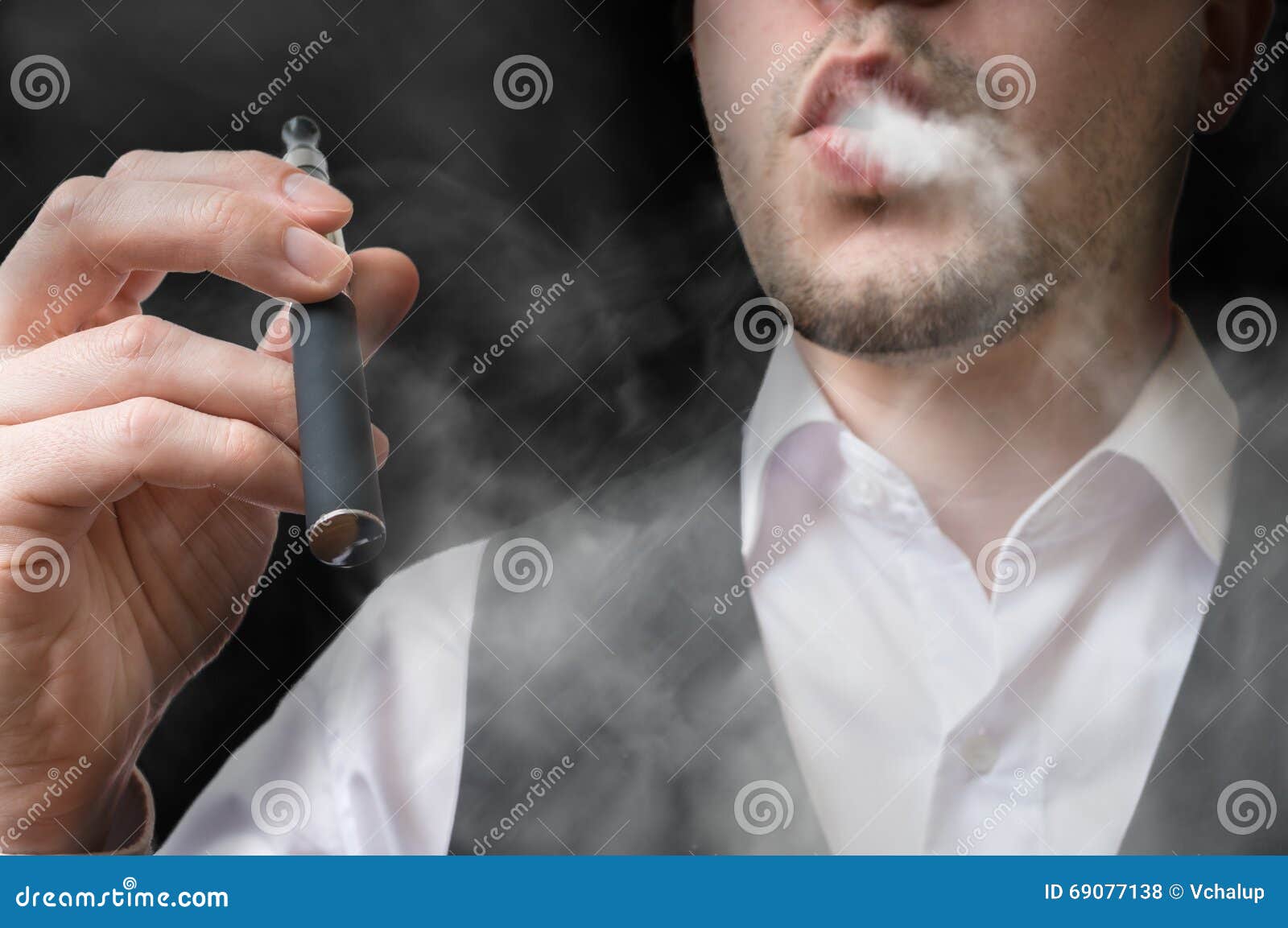 Man Vaping Electronic Cigarette and Blowing Smoke Stock Photo - Image ...