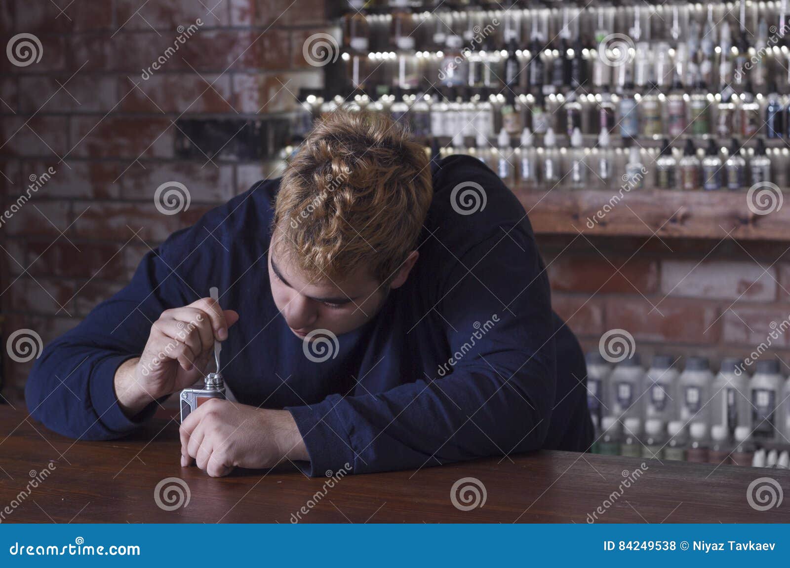 Man at vaping store stock photo. Image of blowing, smoking - 84249538
