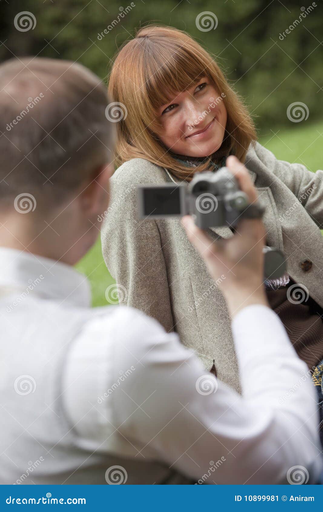 Man with Video Camera Filming Stock Image - Image of filming, smiling ...