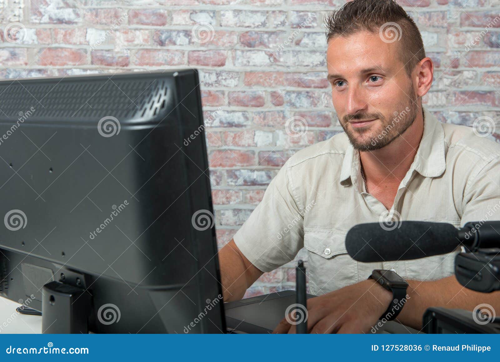 Man Video Editor with Computer and Professional Video Camera Stock ...