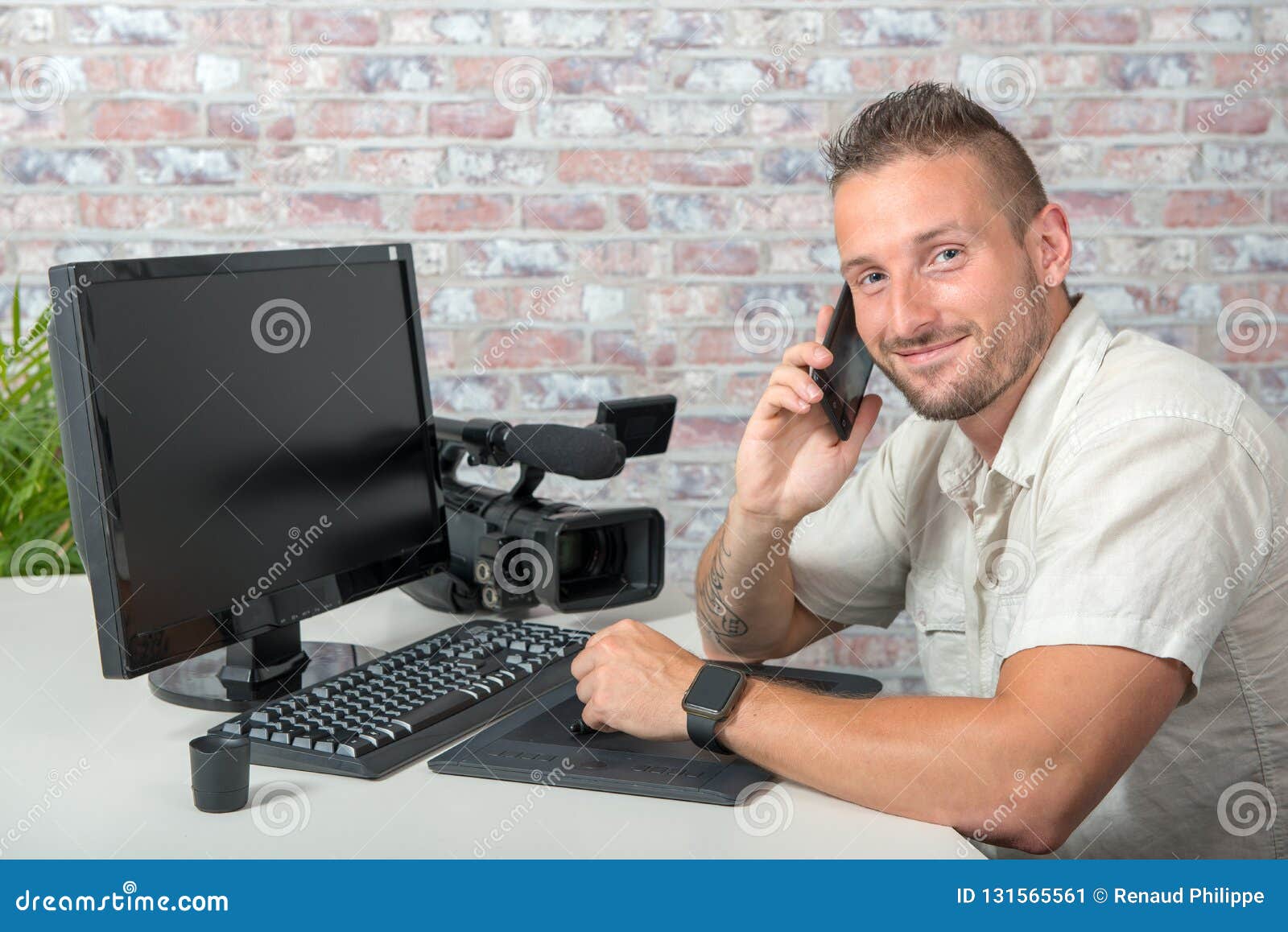 Man Video Editor Using Graphic Tablet and Phone Stock Image - Image of ...