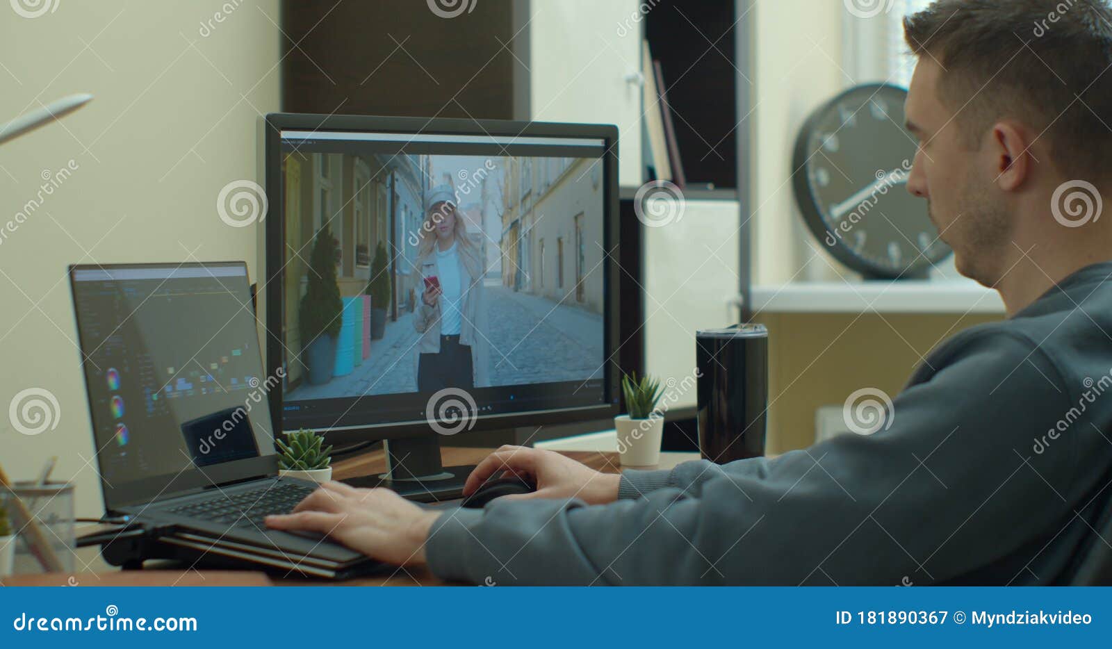 Man Videographer Edits and Cuts Footage and Sound on His Personal ...