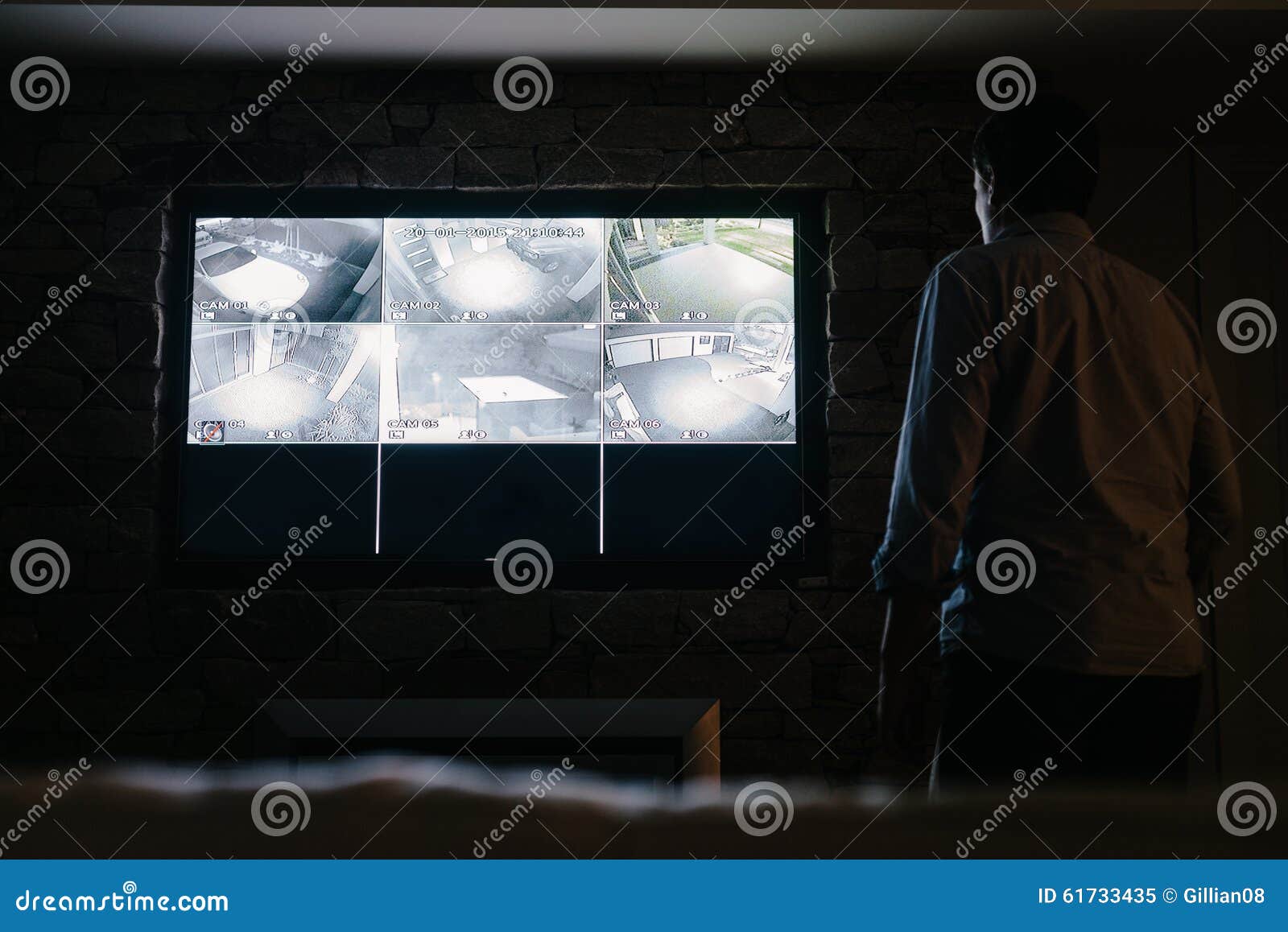 Man Viewing Security Camera Feed Stock Image - Image of alarm, screen ...