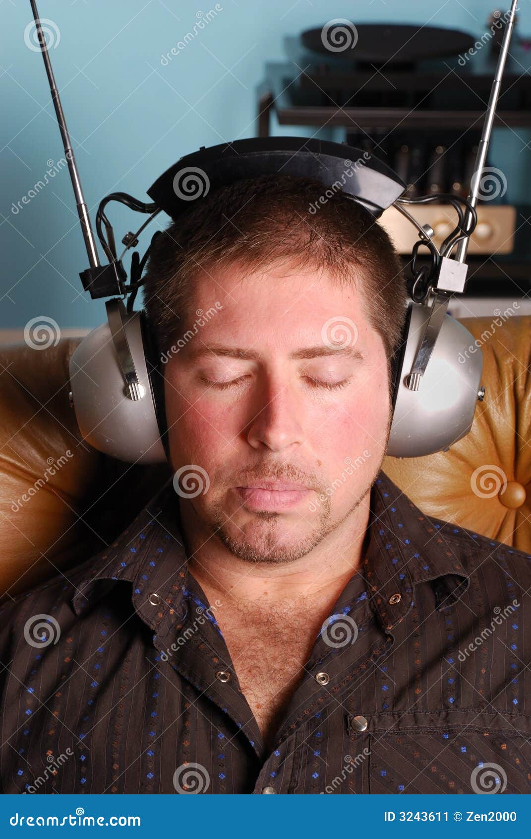 Man with Vintage Headphones Stock Image - Image of lounging, music: 3243611