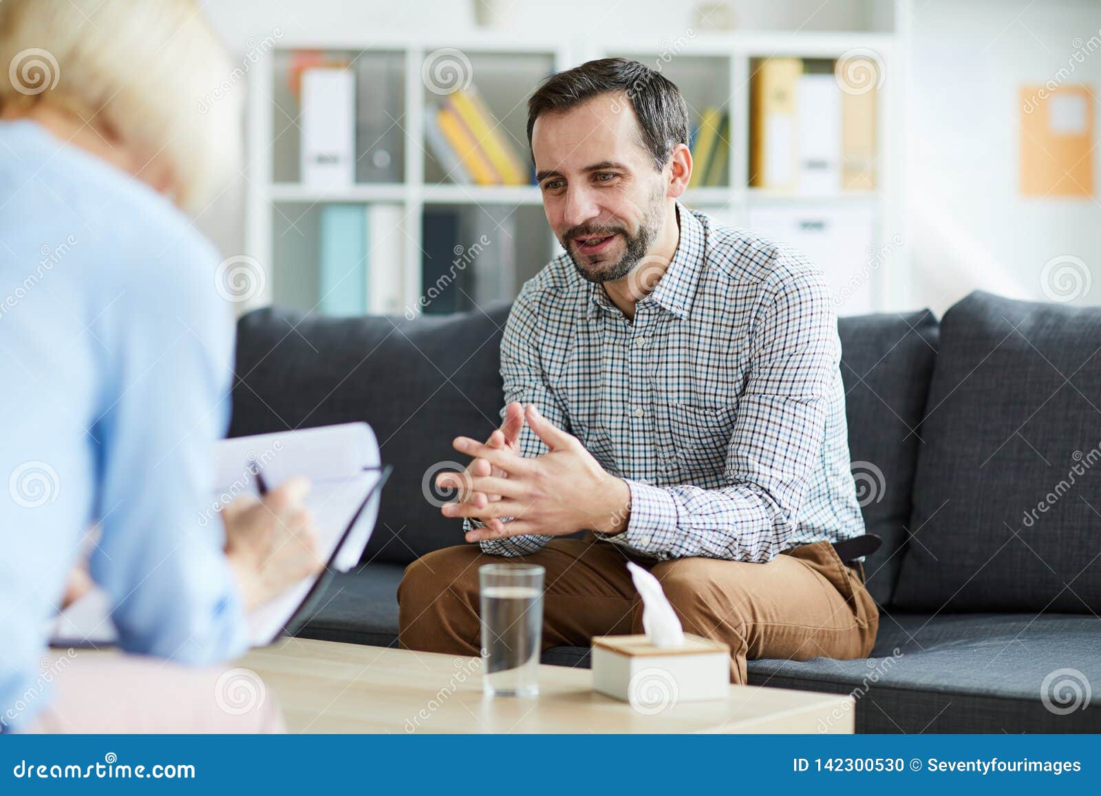 Man visiting counselor stock photo. Image of psychology - 142300530
