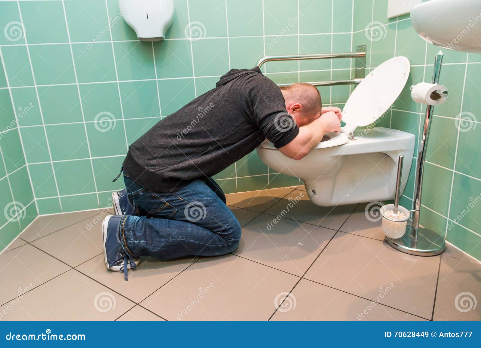 Man Vomiting In The Toilet Stock Photography | CartoonDealer.com #51685220