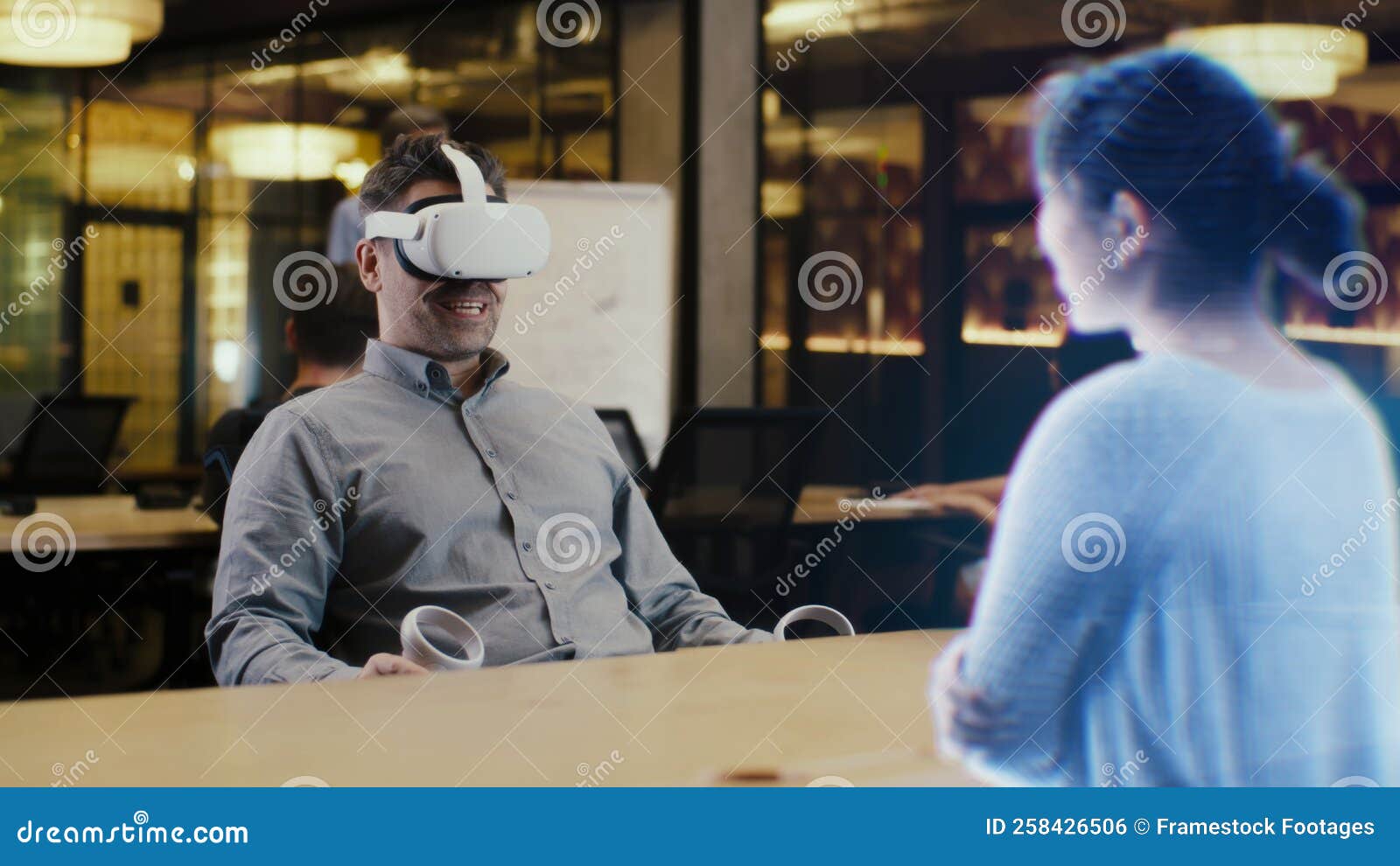 Man with VR Headset Takes Interview of a Candidate Using Augmented ...