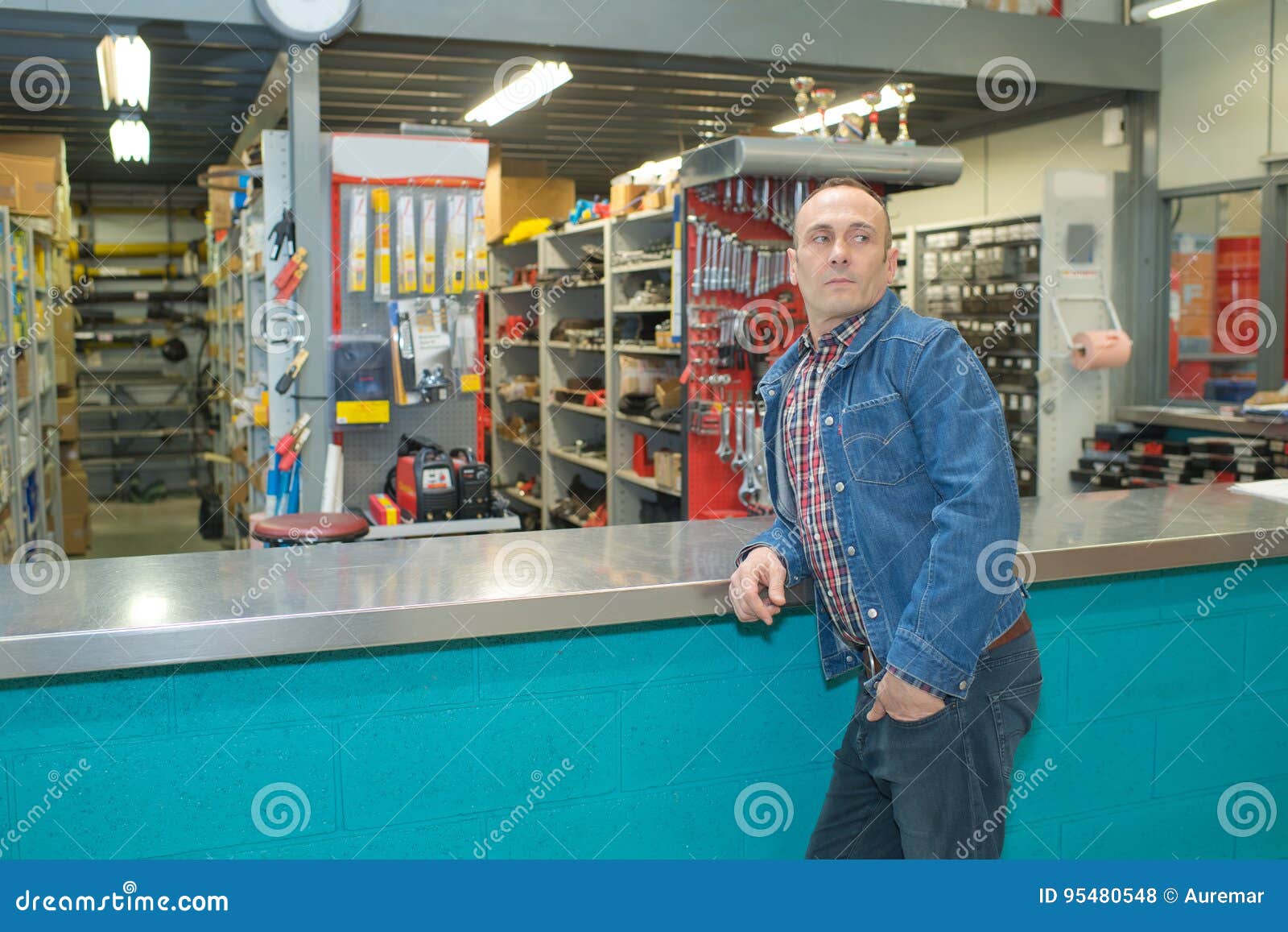 Man Waiting for Assistance at Counter Shop Stock Photo - Image of ...