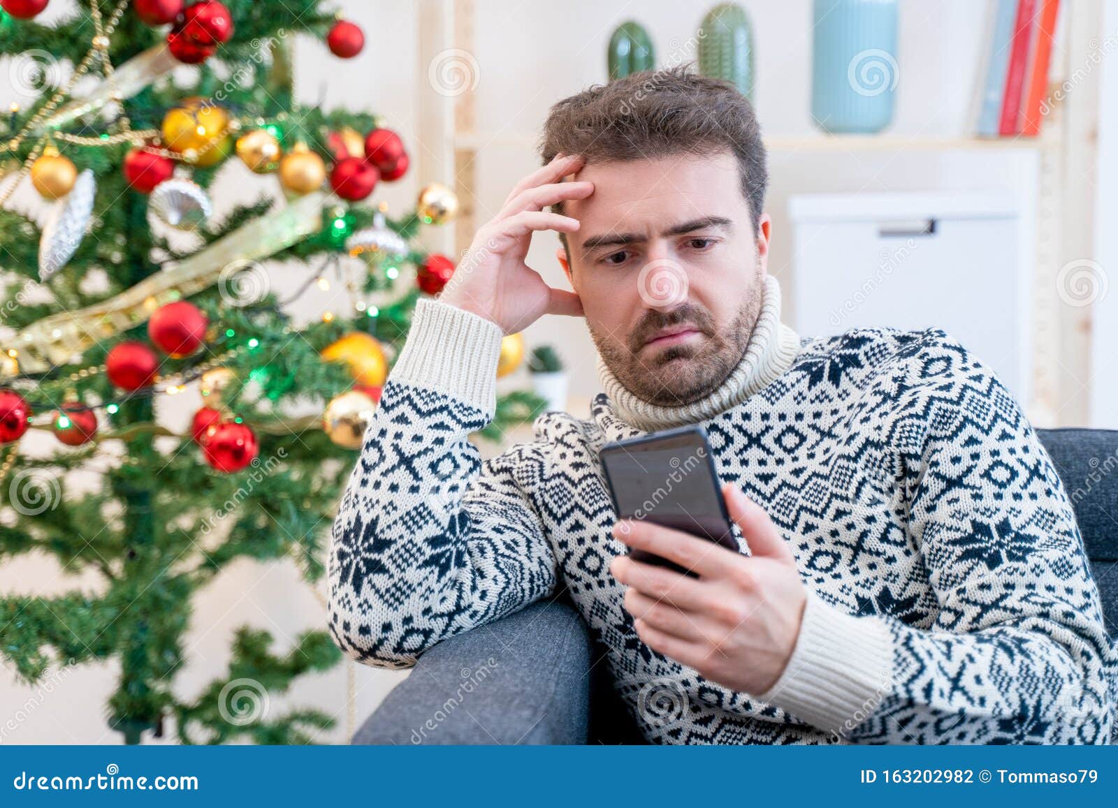 Man Waiting for Christmas Message on Smartphone Stock Photo - Image of ...