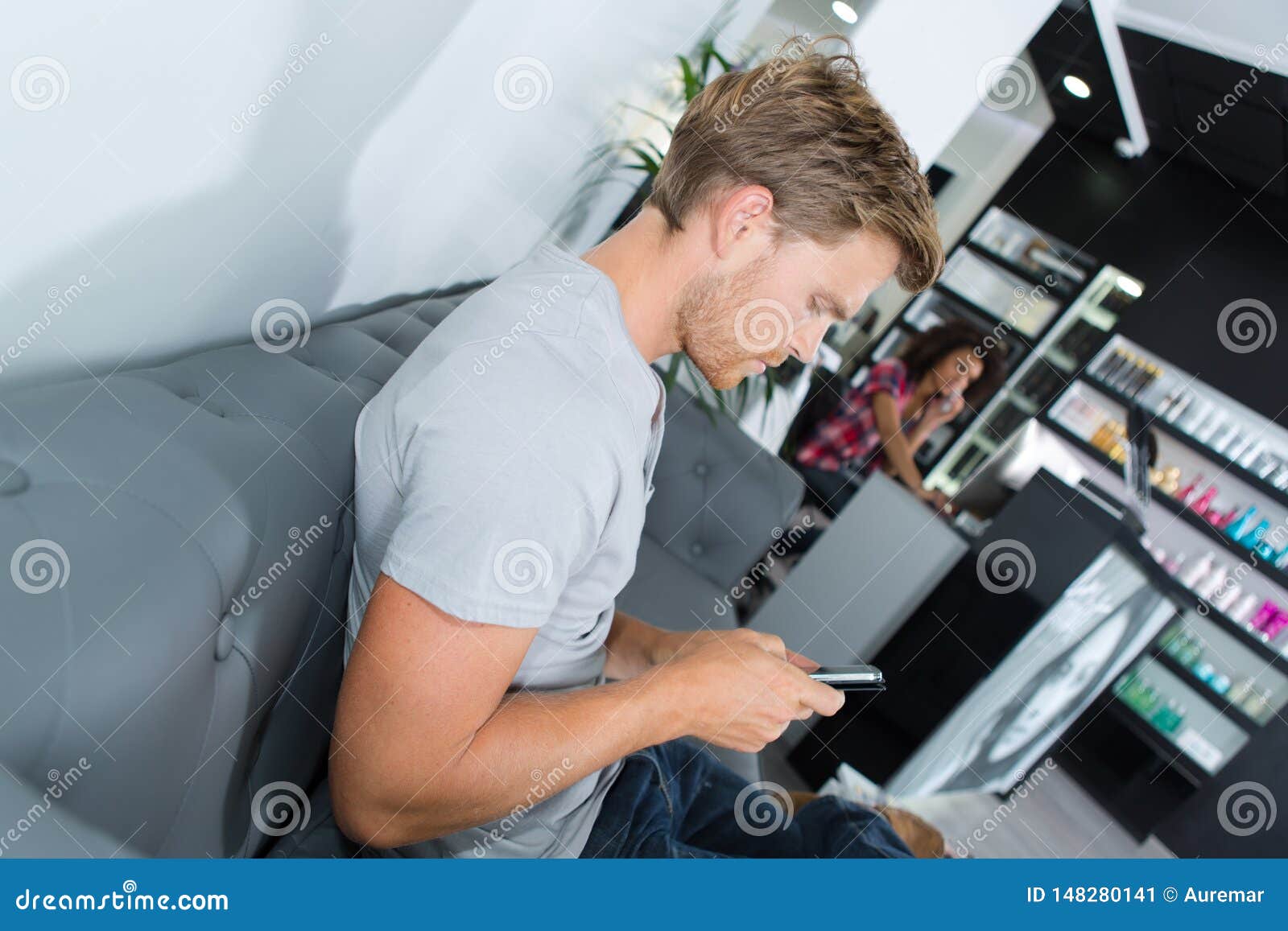 Man Waiting on Couch at Hairdressing Salon Stock Image - Image of ...