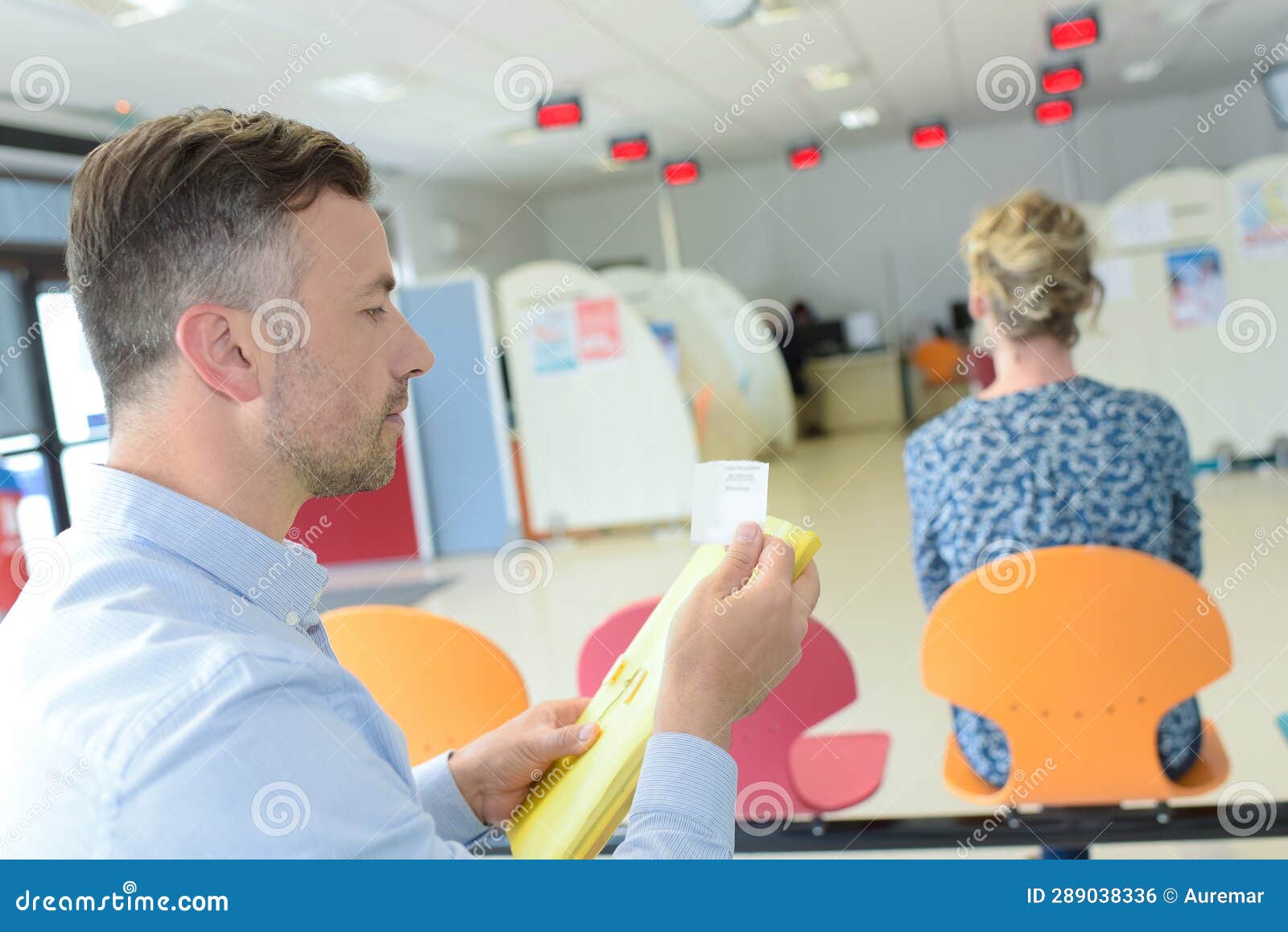 Man Waiting for Number To Be Called Stock Photo - Image of eternity ...