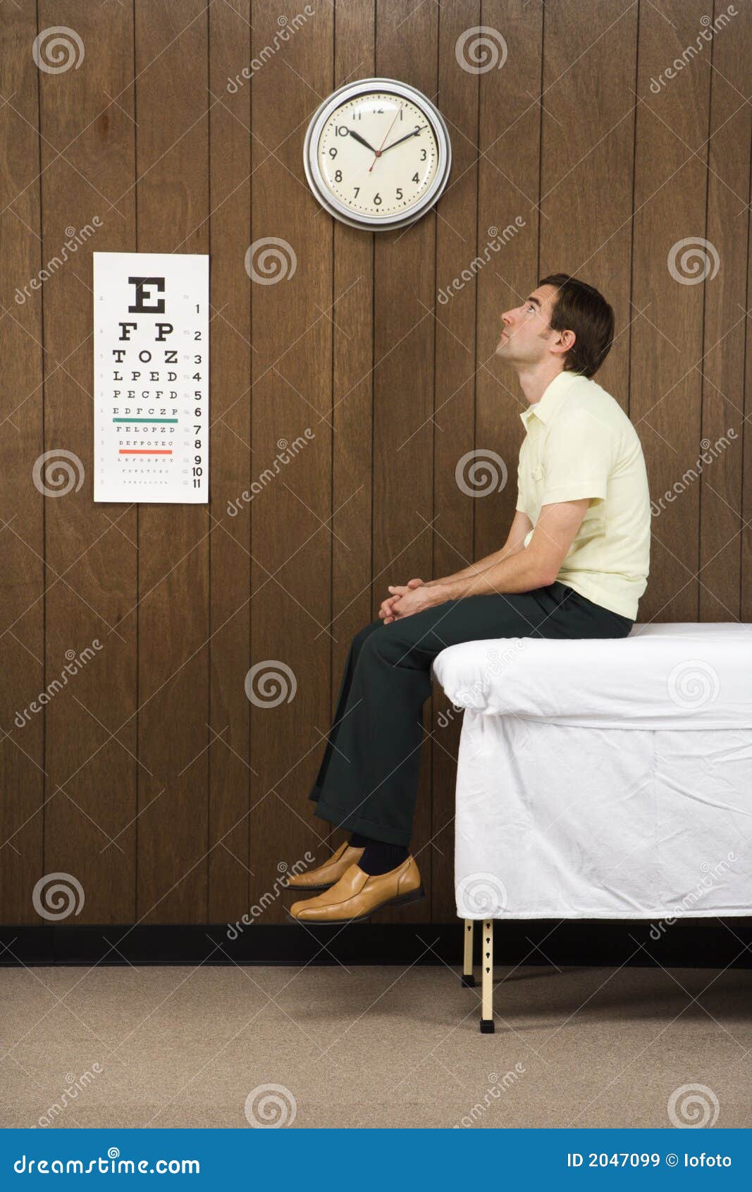 Man Waiting in Retro Doctor S Office. Stock Image - Image of clock ...