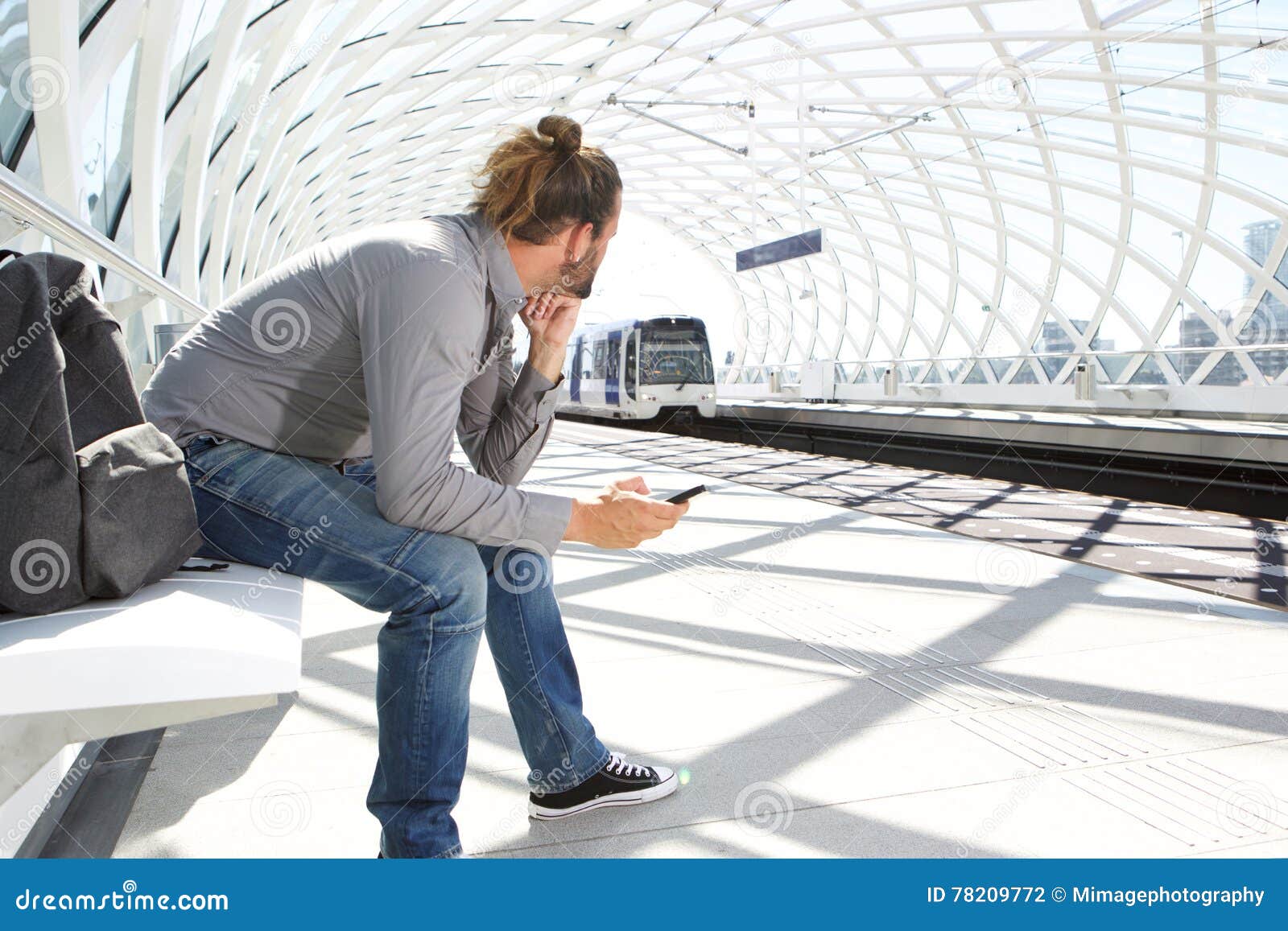 Man Waiting for Train Arriving at Station Stock Photo - Image of modern ...
