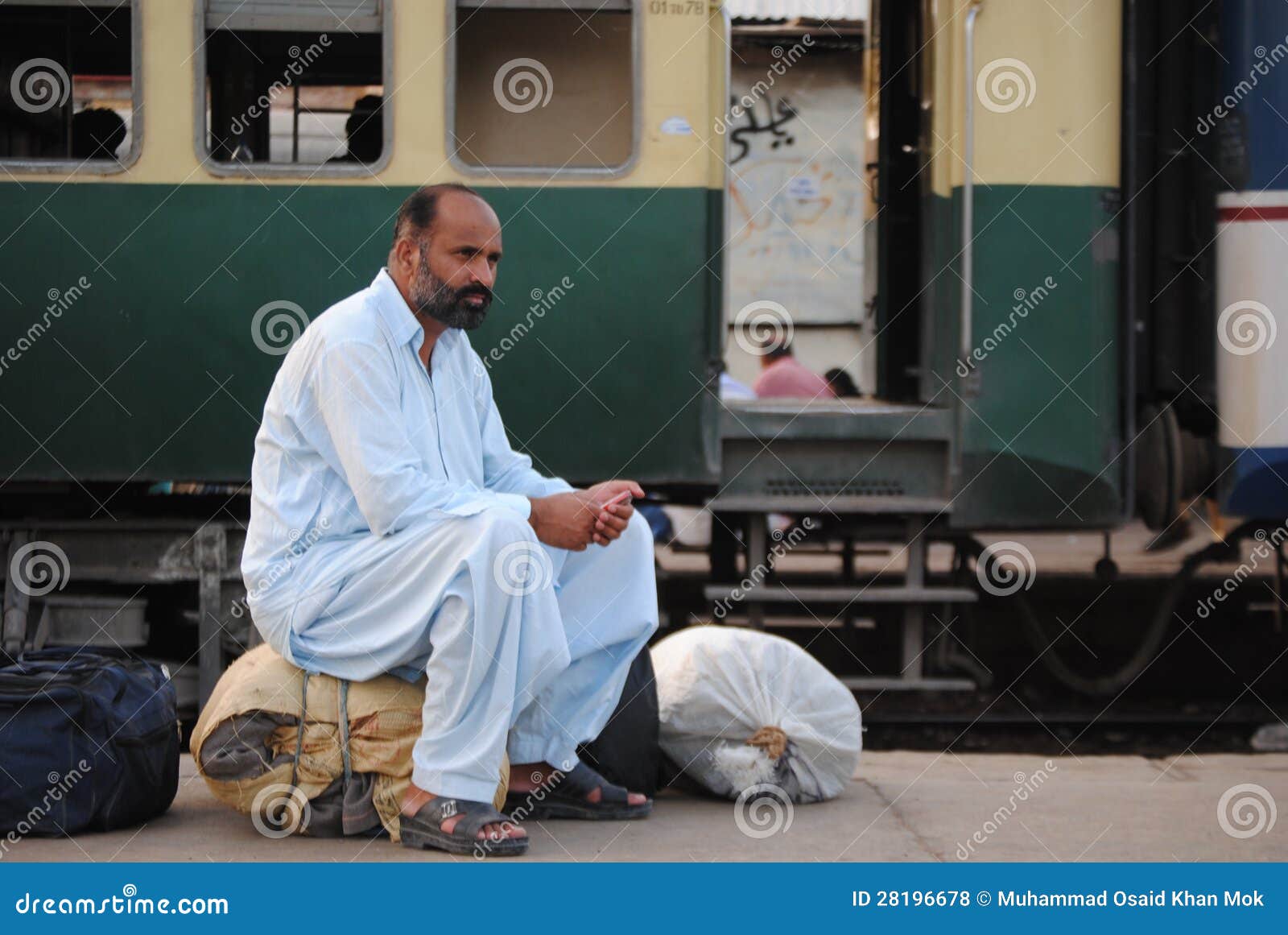 Man Waits at Station, Trains Delayed. Editorial Stock Photo - Image of ...