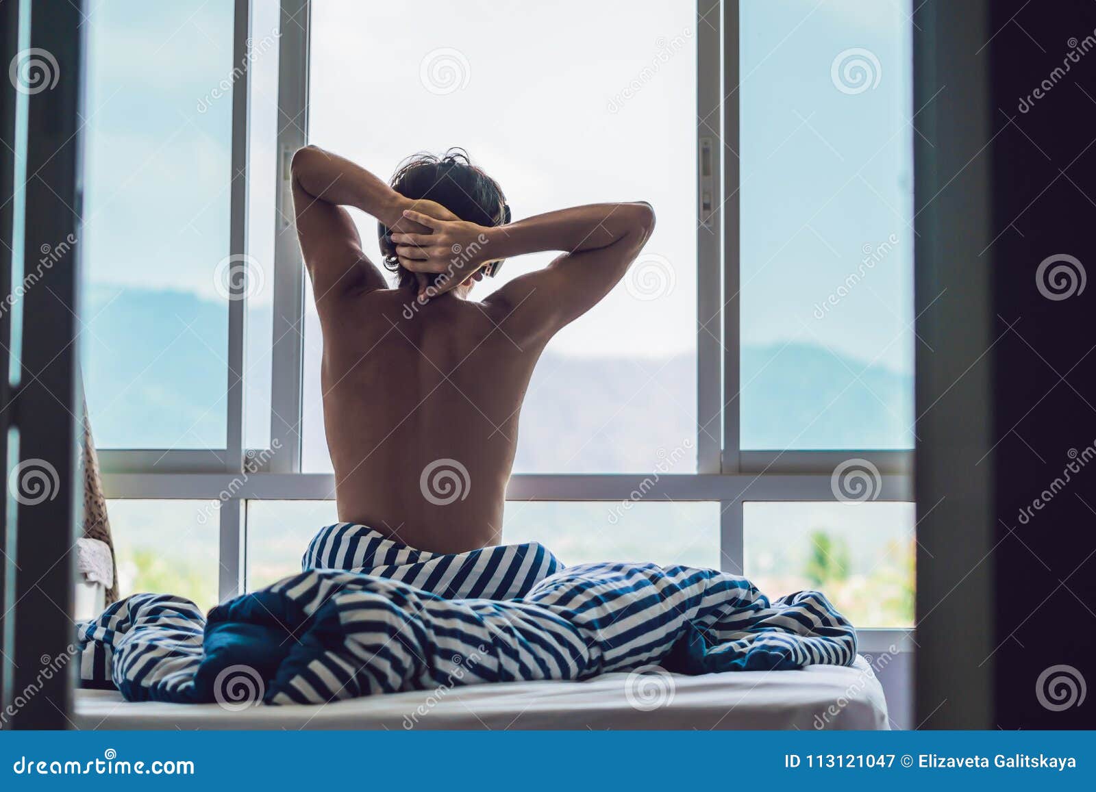 Man Wake Up and Stretching in Morning with Mountain View Stock Image ...