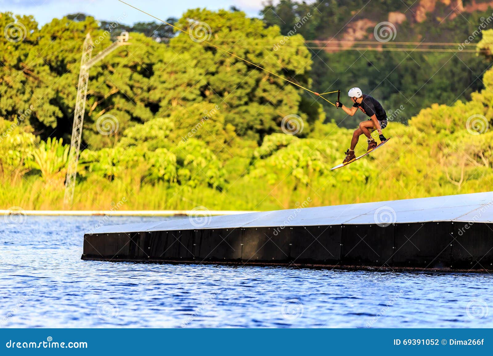 Man Wakeboarding. Jumping stock photo. Image of recreation - 69391052