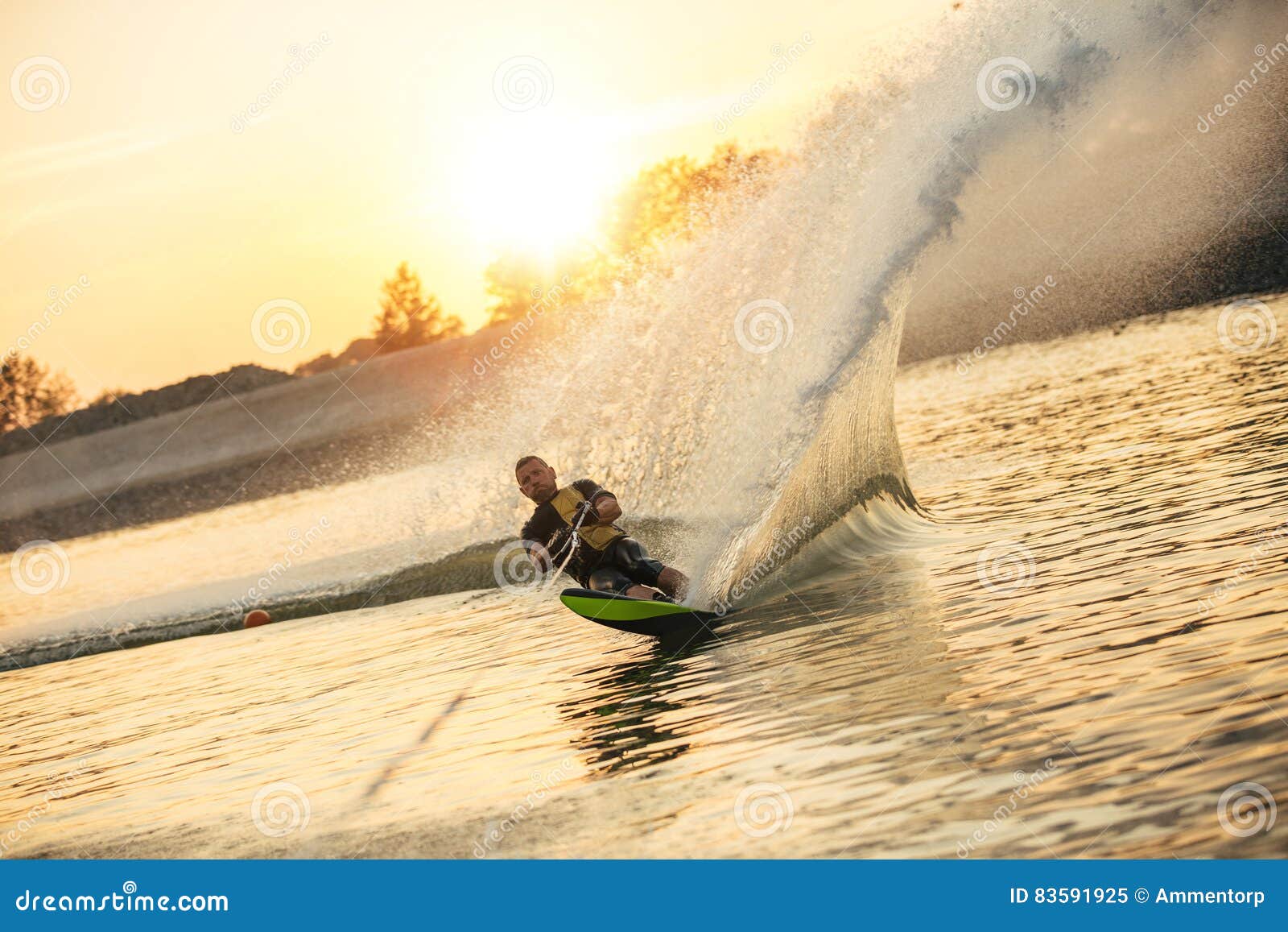 Man wakeboarding on a lake stock image. Image of nature - 83591925
