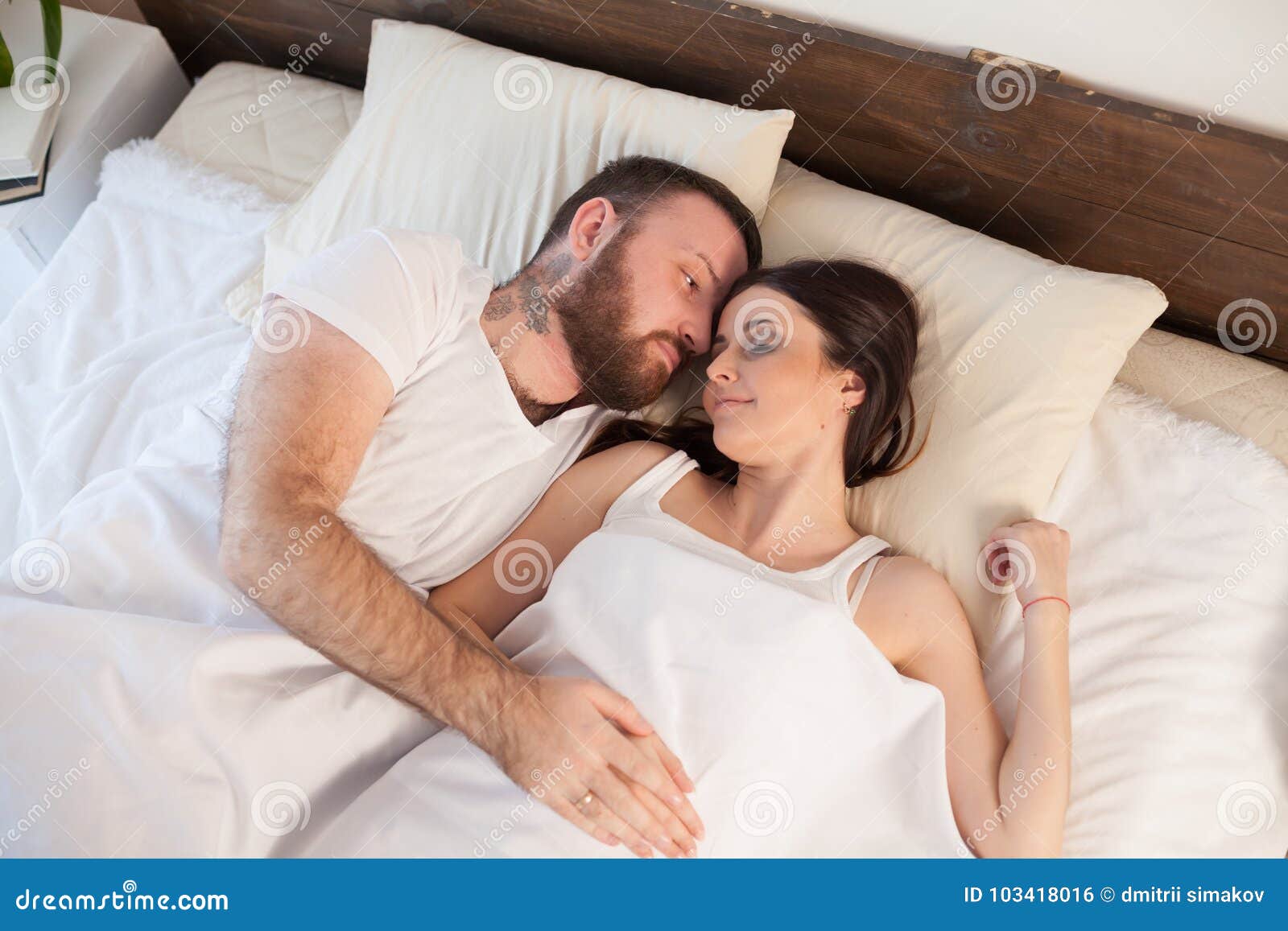 Man Wakes a Woman in the Bedroom in the Morning Weekend Stock Photo ... Man Wakes a Woman in the Bedroom in the Morning Weekend Stock Photo ...