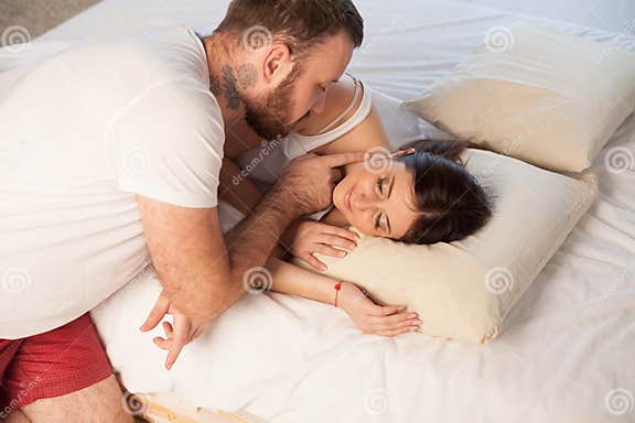Man Wakes a Woman in the Morning Stock Photo - Image of life ... Man Wakes a Woman in the Morning Stock Photo - Image of life ...