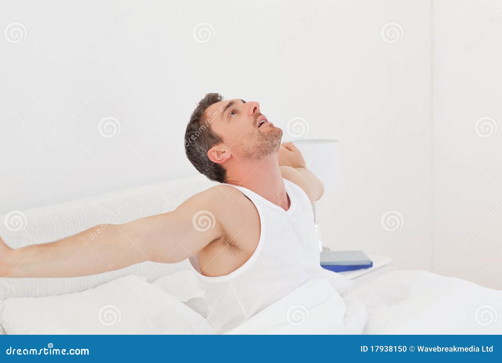 A man waking up stock photo. Image of looking, resting - 17938150