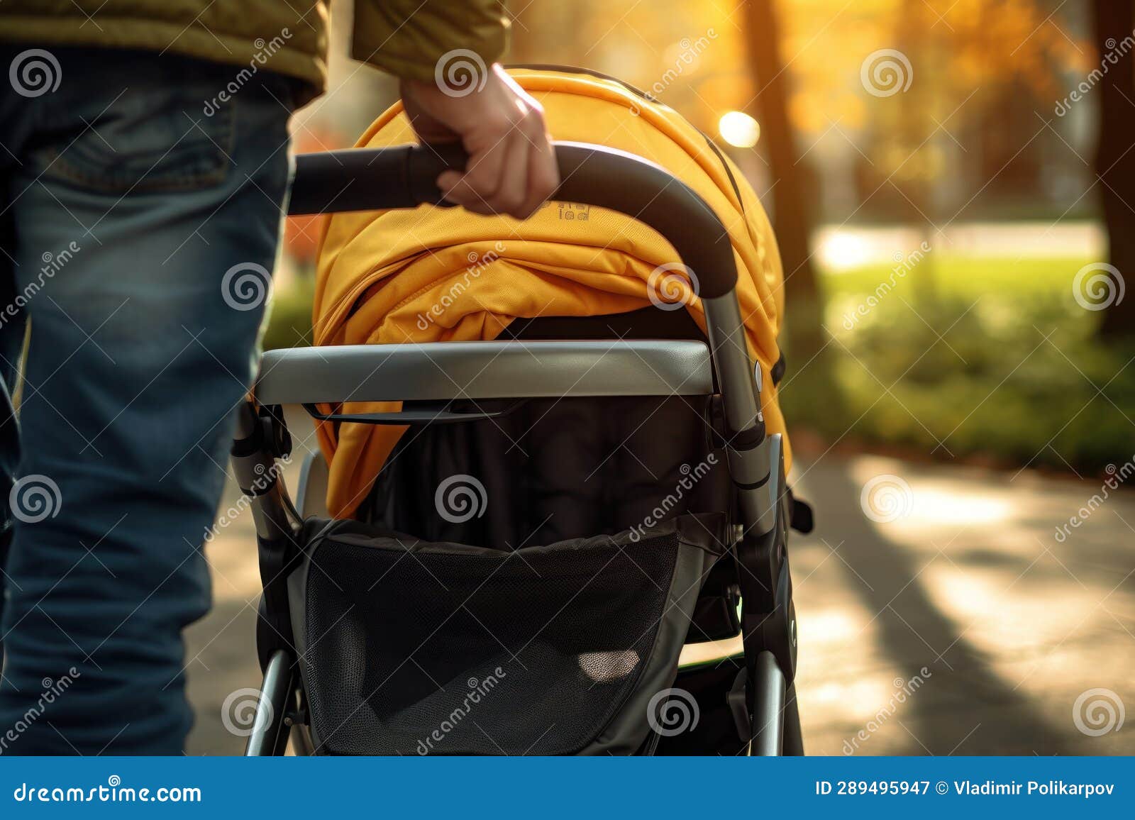 A Man on a Walk with a Baby Stroller Stock Image - Image of park ...