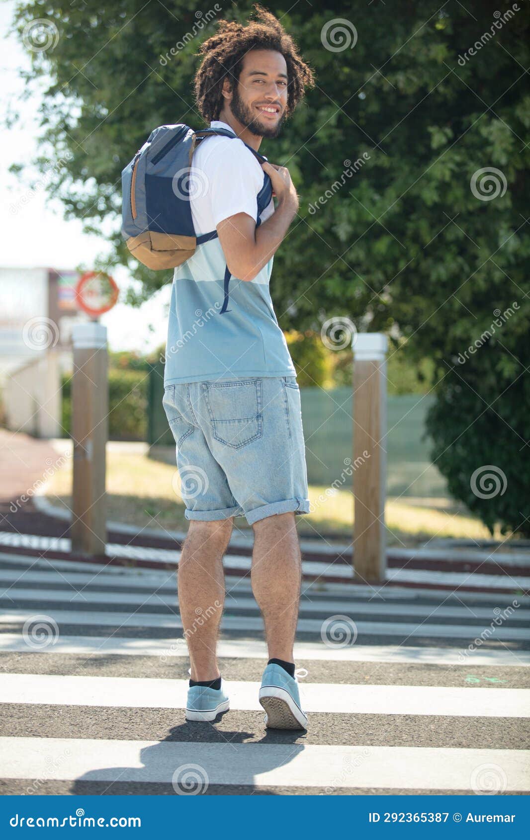 Man Walking Across Zebra Crossing Stock Image - Image of student, walk ...