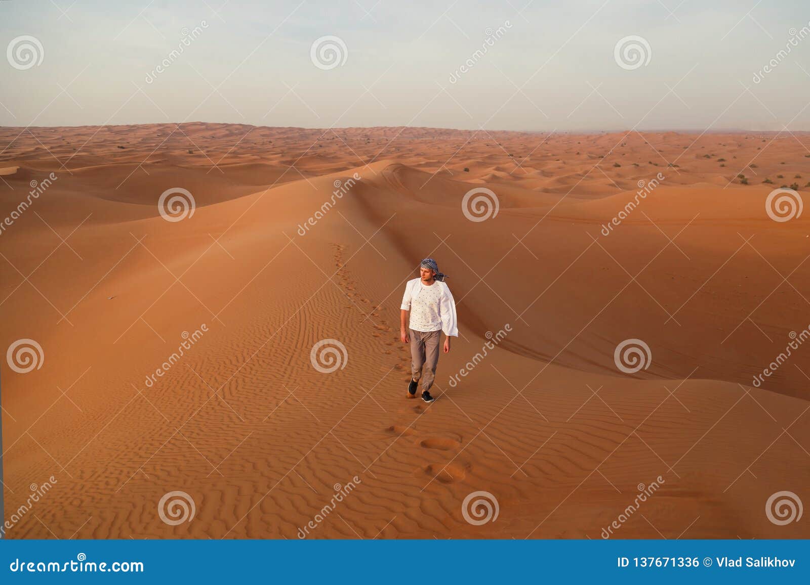 Man Walking Alone in the Sunny Desert Near Dubai Stock Photo - Image of ...