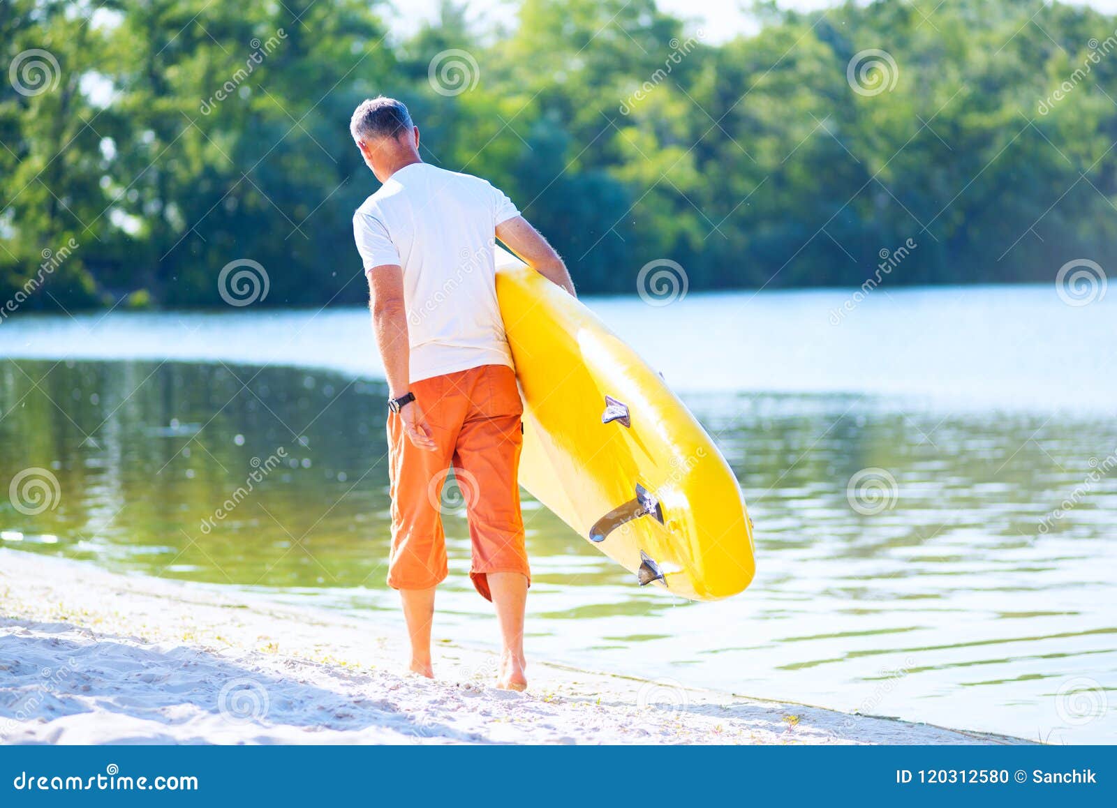 Man is Walking Along the Beach with a SUP Board Stock Photo - Image of ... Man is Walking Along the Beach with a SUP Board Stock Photo - Image of ...