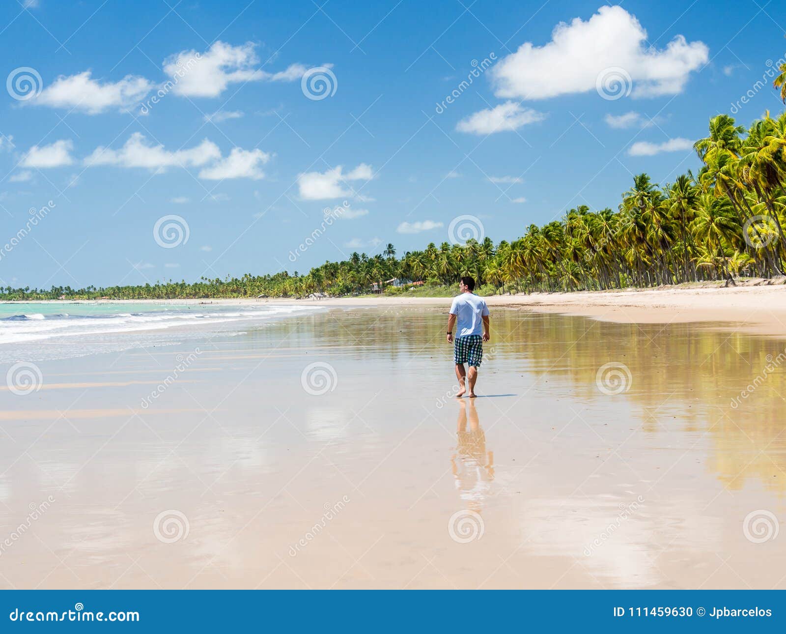 Man Walking Along Beach View on a Summer Day Stock Photo - Image of ... Man Walking Along Beach View on a Summer Day Stock Photo - Image of ...