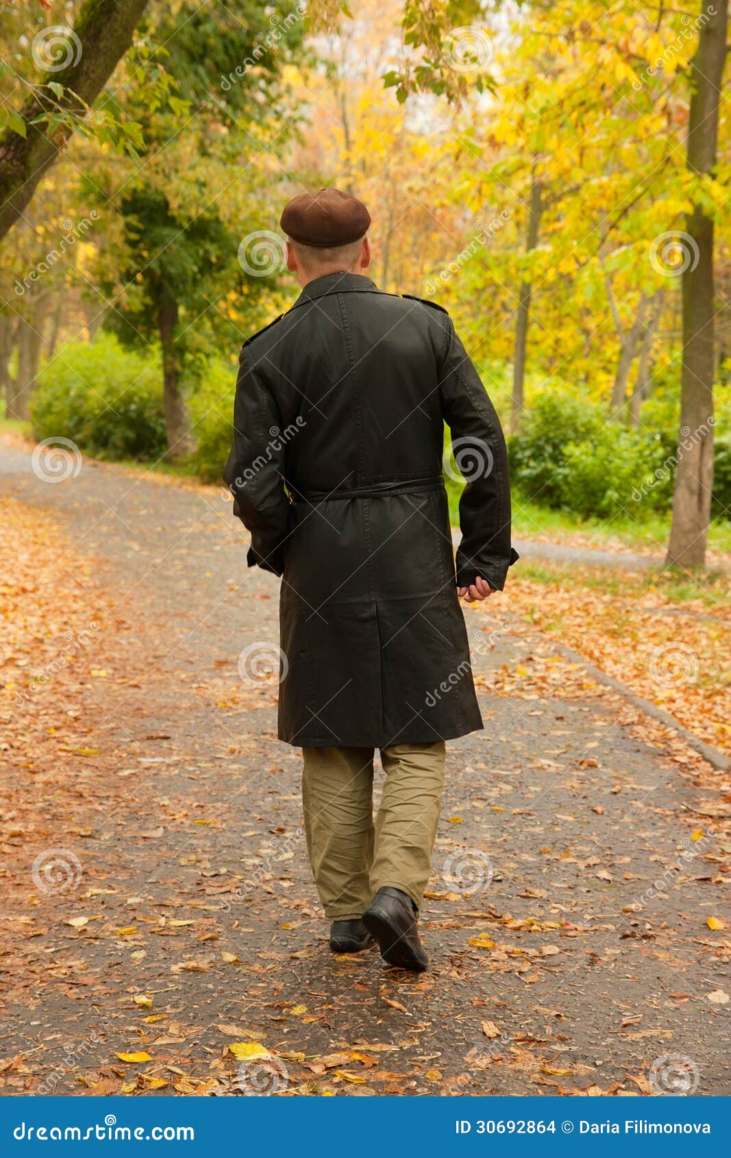 Man walking in autumn stock photo. Image of yellow, scarf - 30692864