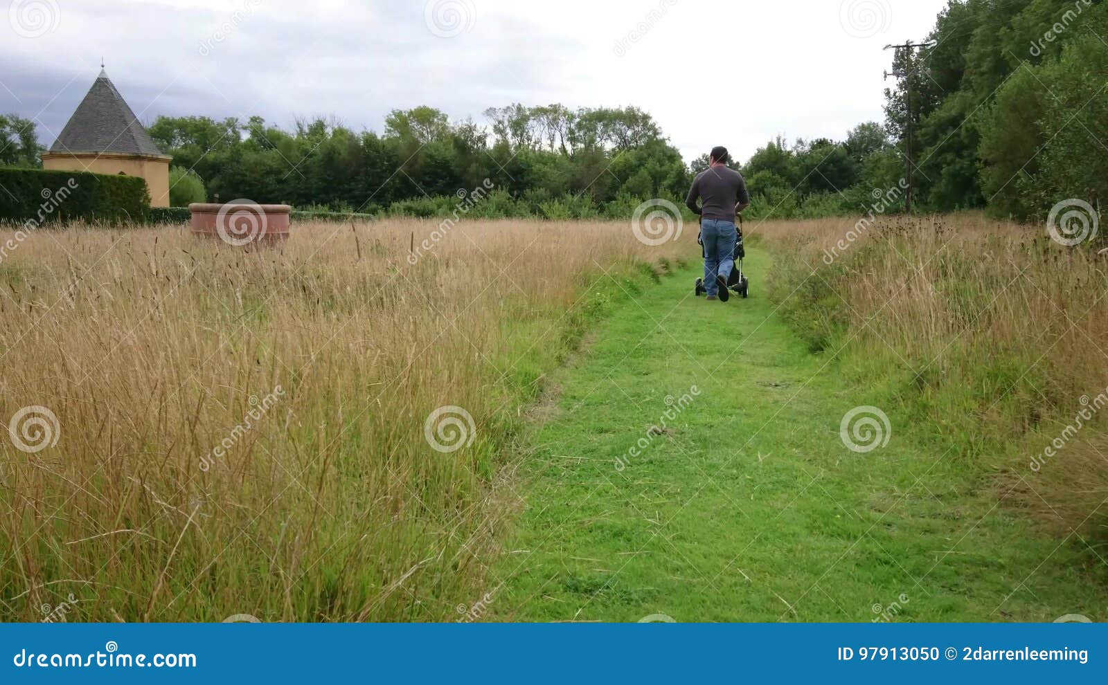 Man Walking Away from the Camera with a Pram Stock Footage - Video of ...