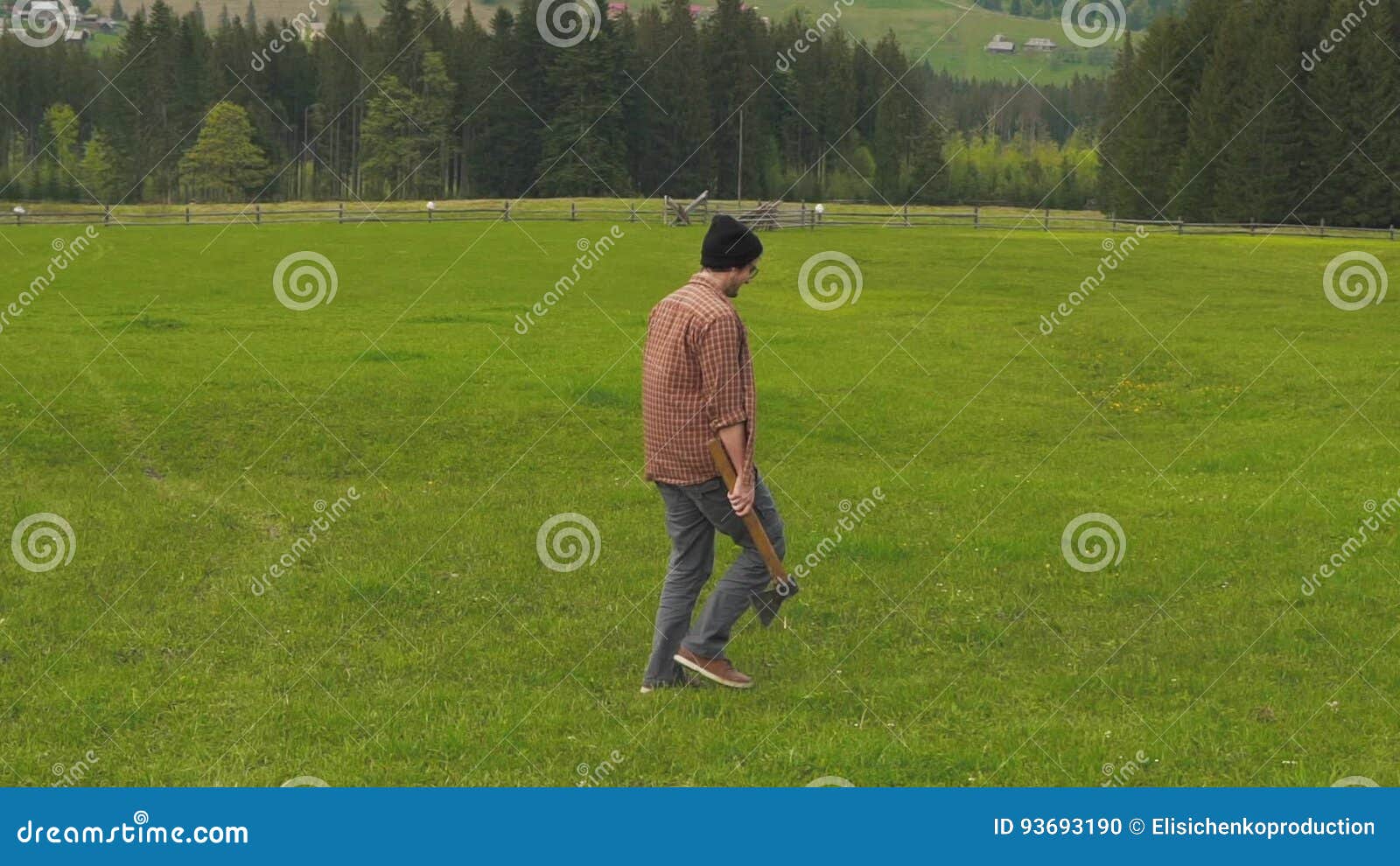 Man is Walking with Axe in Green Valley Stock Footage - Video of ...