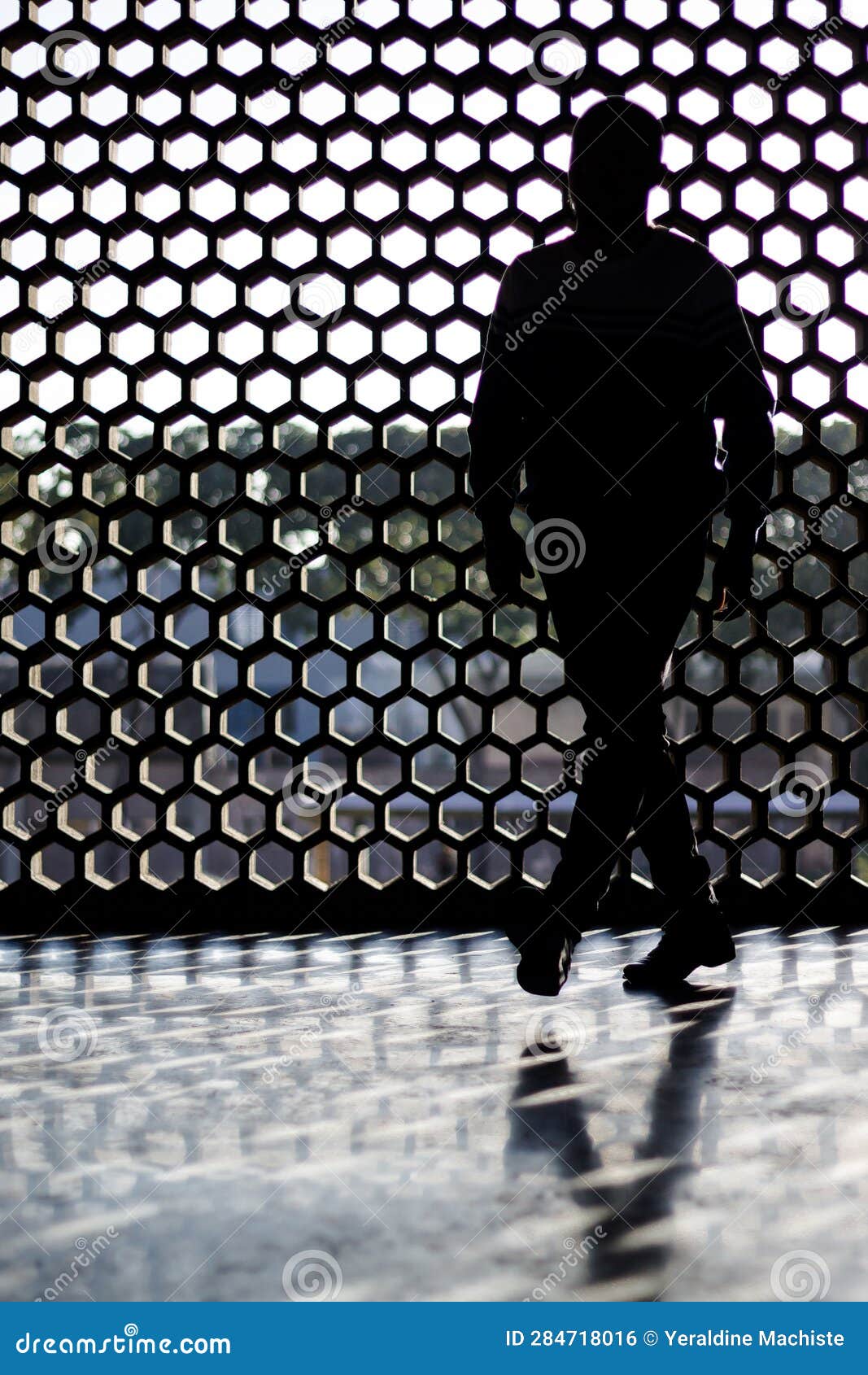 Man Walking Backwards Against Backlighting Stock Photo - Image of ...