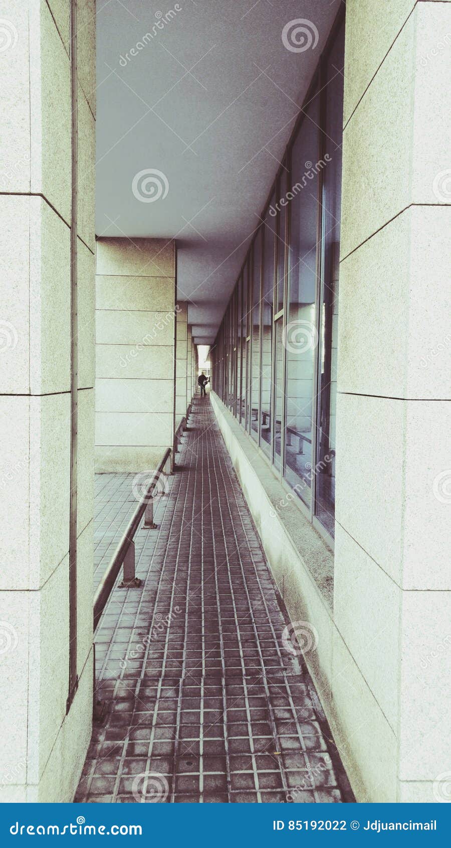 Man Walking in a Corridor. Street Architecture Stock Photo - Image of ...