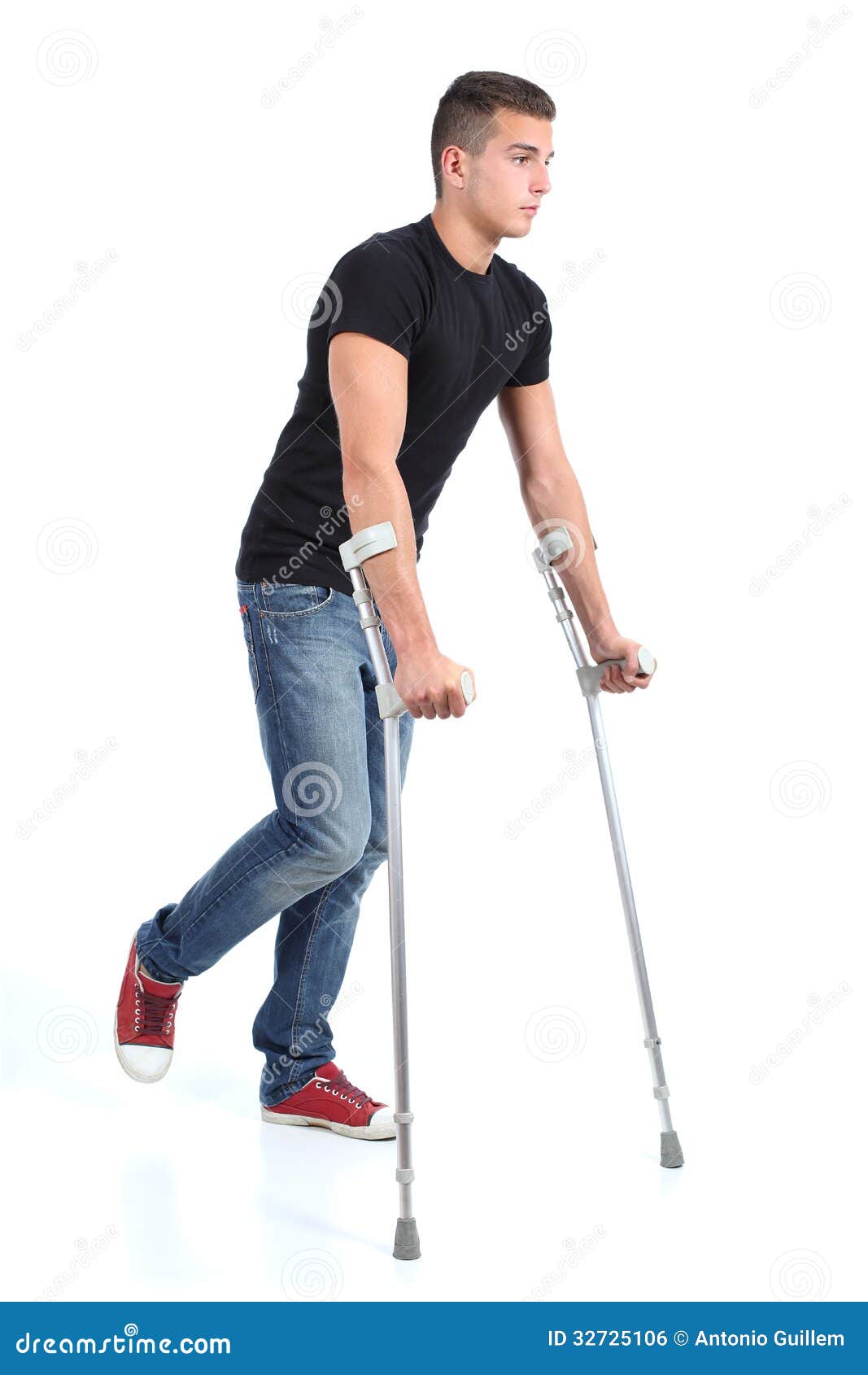 Man walking with crutches stock photo. Image of health - 32725106