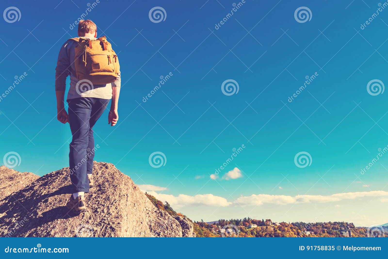 Man Walking on the Edge of a Cliff Stock Image - Image of filtered ...