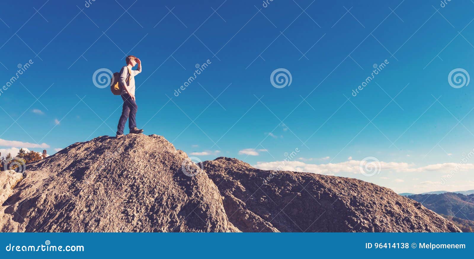 Man Walking on the Edge of a Cliff Stock Photo - Image of filtered ...