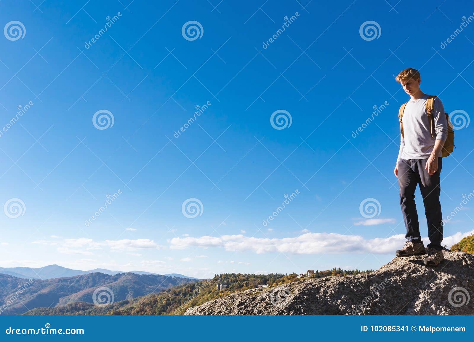 Man Walking on the Edge of a Cliff Stock Image - Image of male, hiker ...