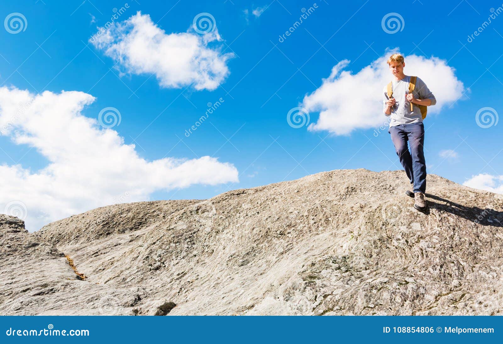 Man Walking on the Edge of a Cliff Stock Photo - Image of overlook ...