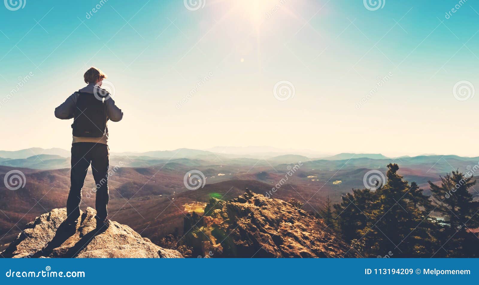Man Walking on the Edge of a Cliff Stock Image - Image of outdoor ...